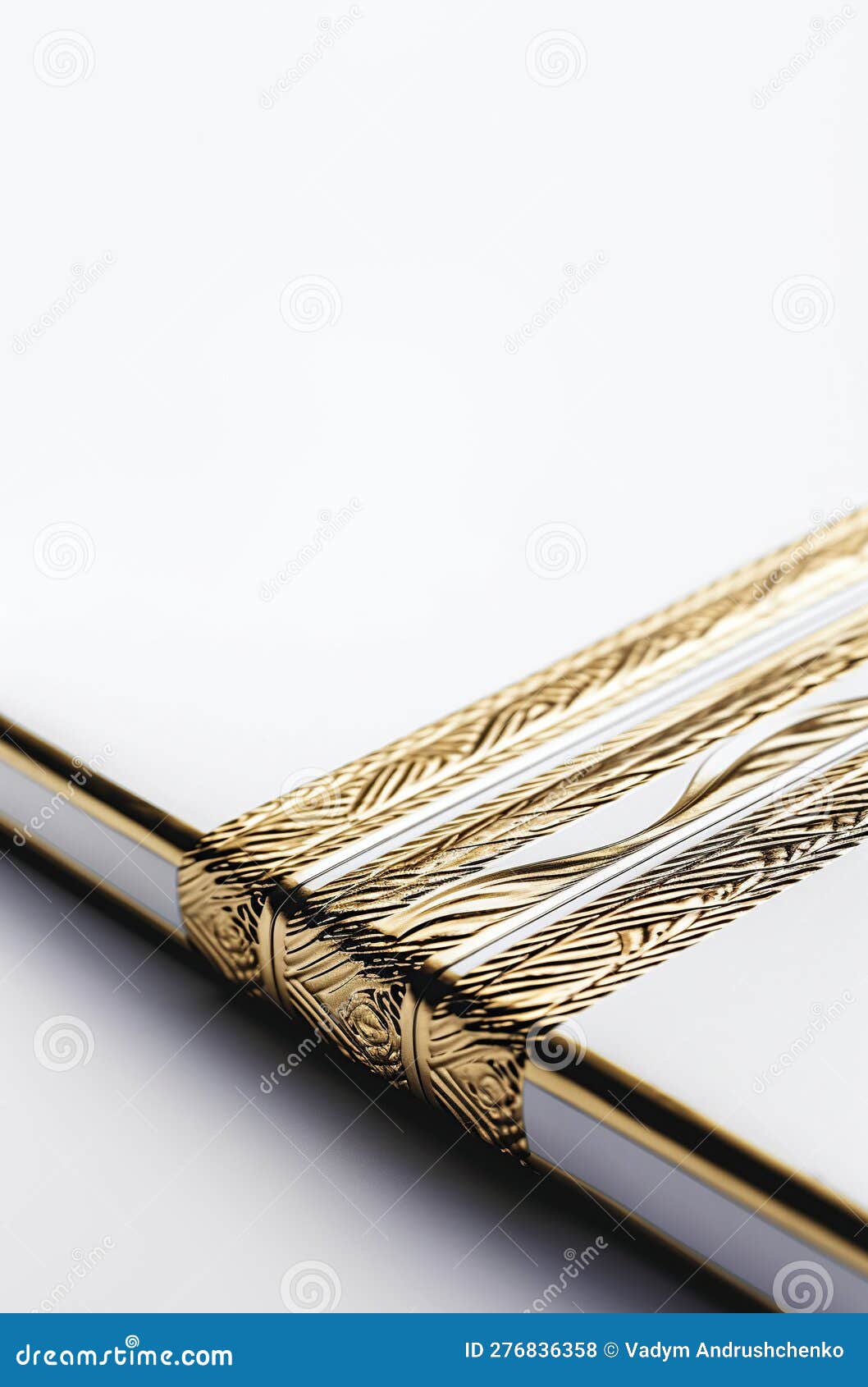 White Book or Notebook Cover with Gold Embossing Background with Copy ...