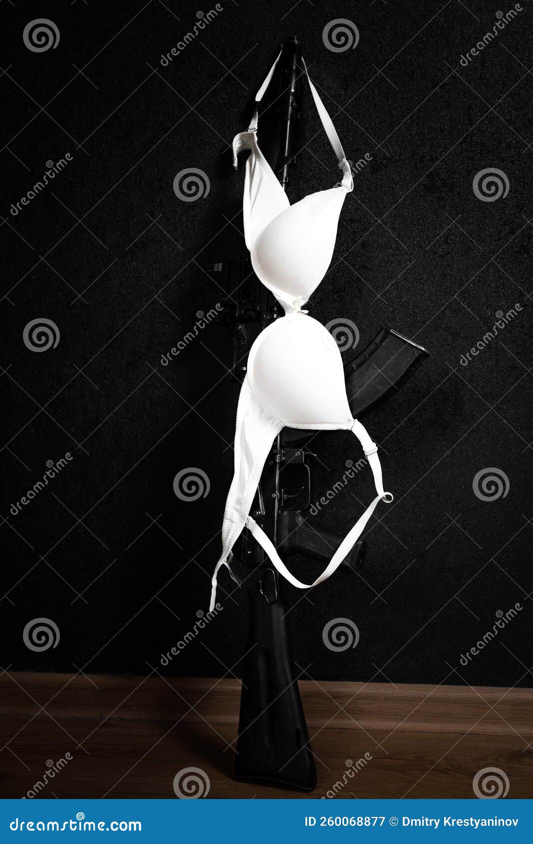 Weapon and bra stock image. Image of sexuality, sensuality - 260068877