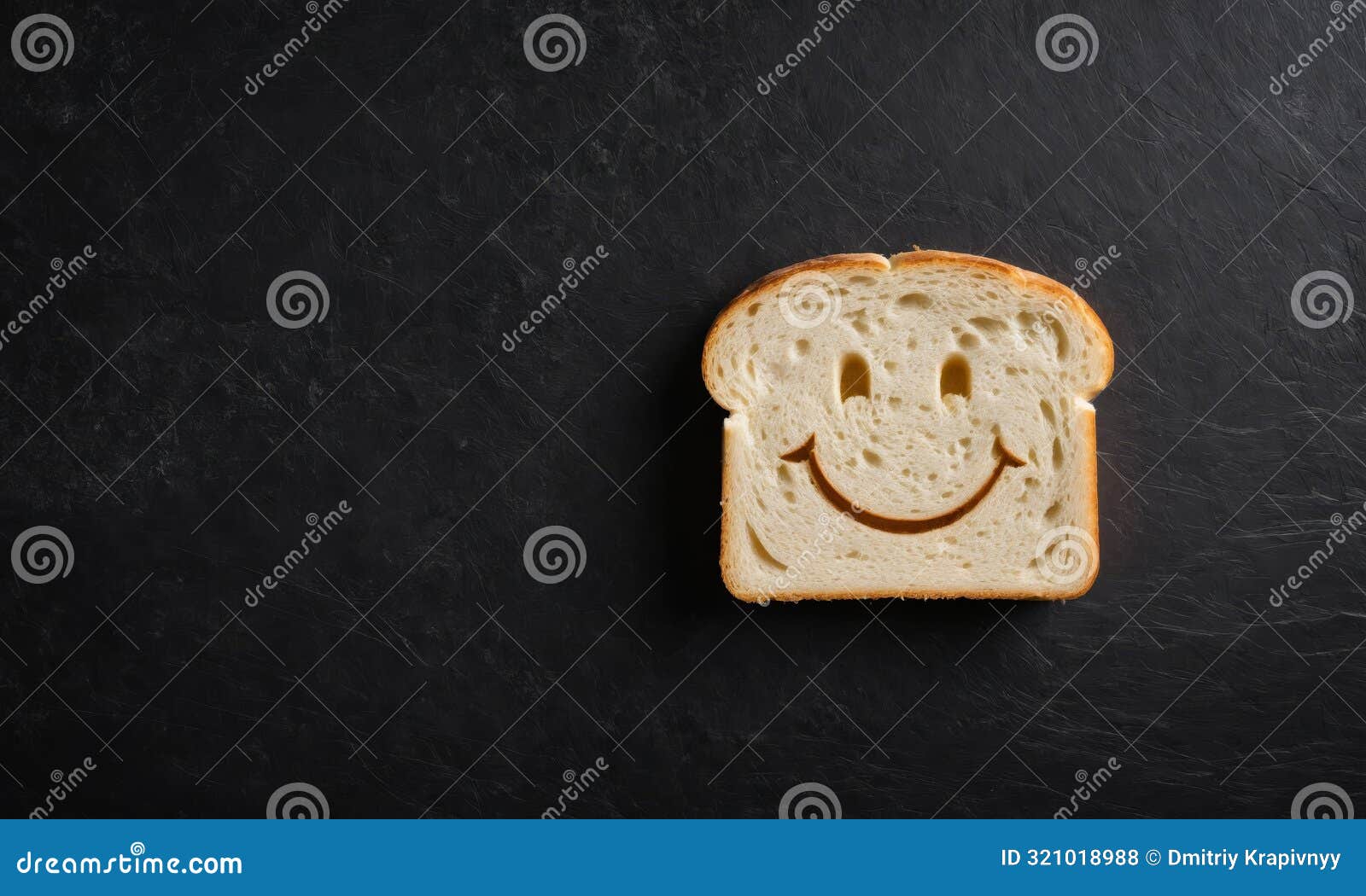 Slice of White Bread with Smiley Face Design on Black Background Stock ...