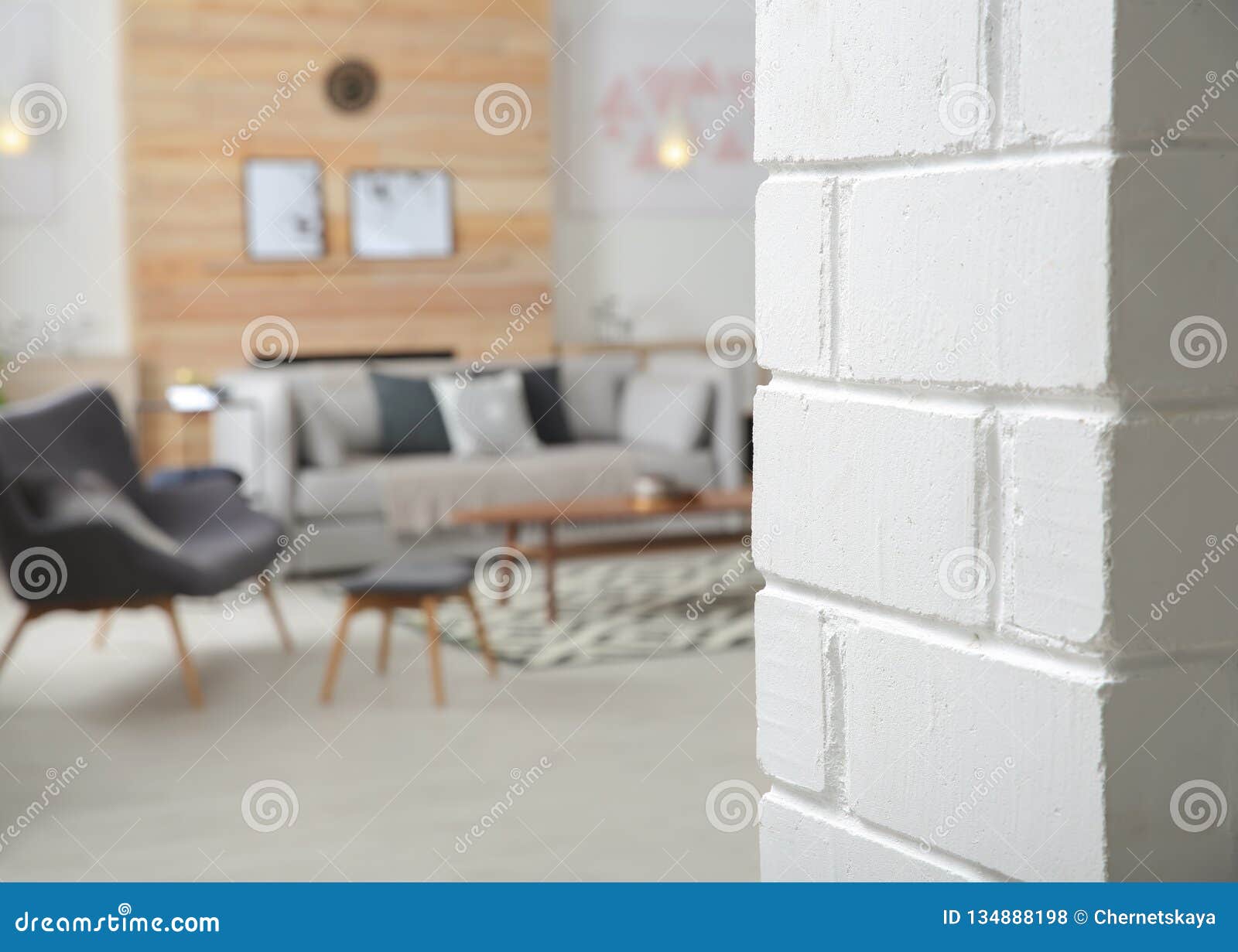 White Brick Wall and Blurred Living Room Interior Stock Photo - Image ...