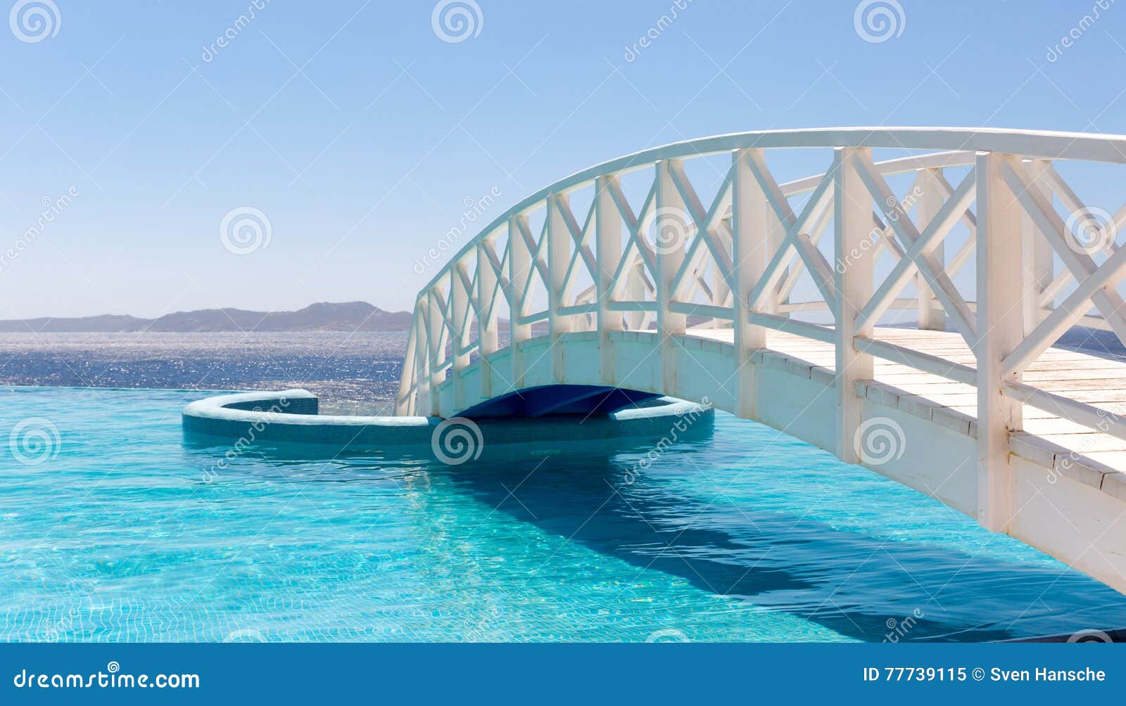 White Bridge Over Infinity Pool Stock Image - Image of resort ...