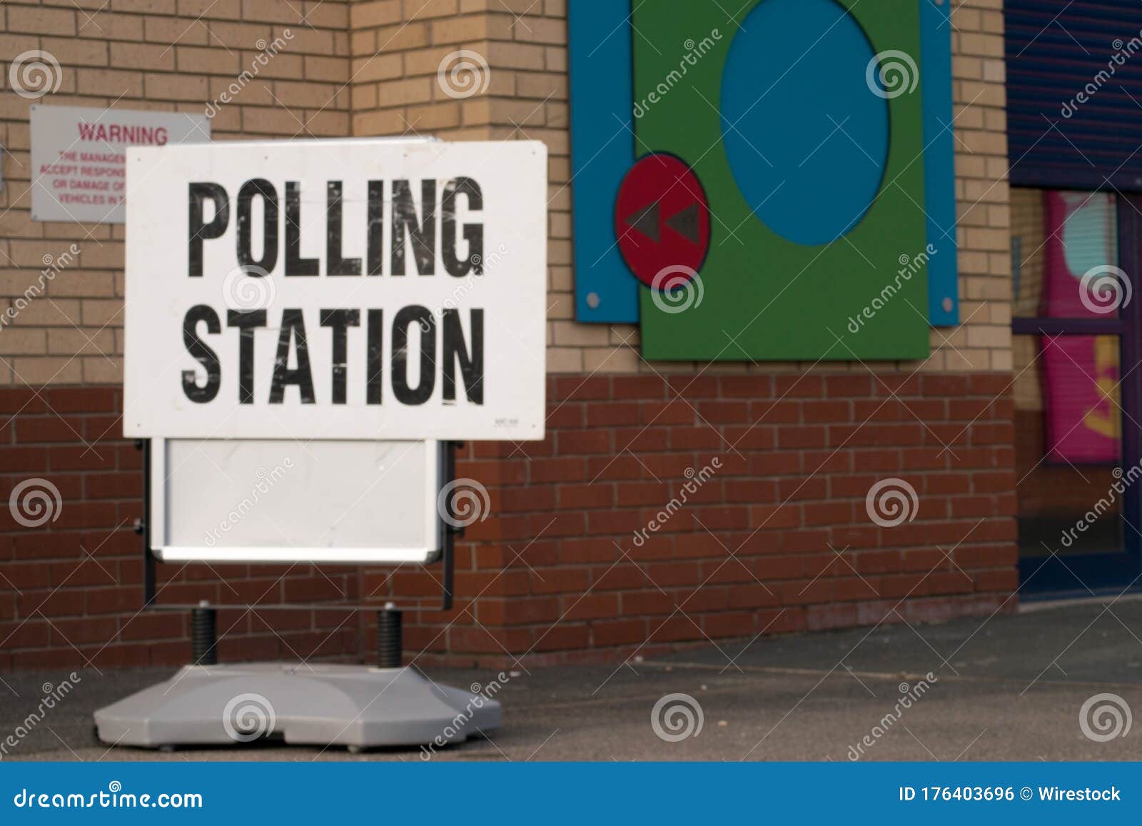 White British Polling Station Sign in Front of a Stone Building Stock ...