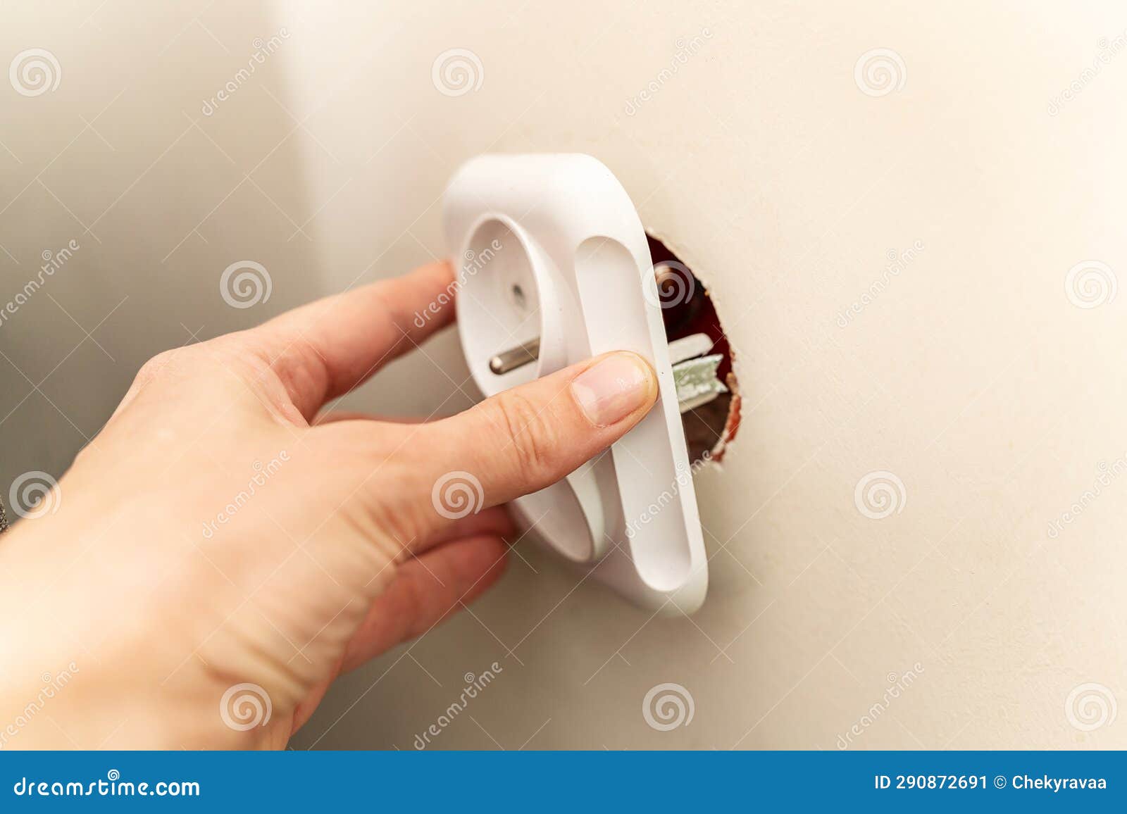 White Broken Electrical Socket Fell Out of the Wall. the Socket is Torn ...