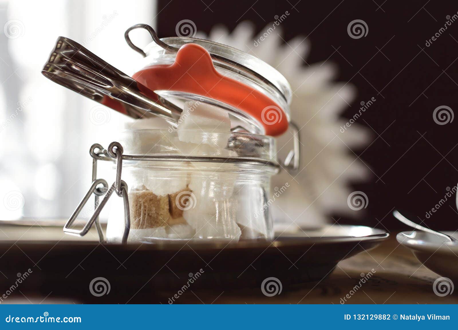 White and Brown Sugar Refined Sugar in a Glass Sugar Bowl on a Table in ... White and Brown Sugar Refined Sugar in a Glass Sugar Bowl on a Table in ...