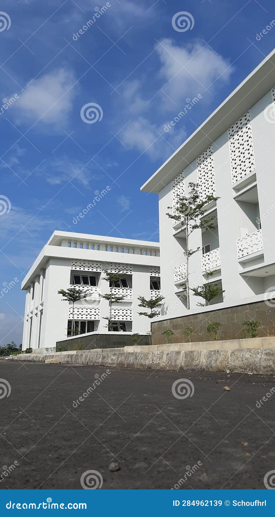 White Building for College with Blue Skies Stock Image - Image of skies ...