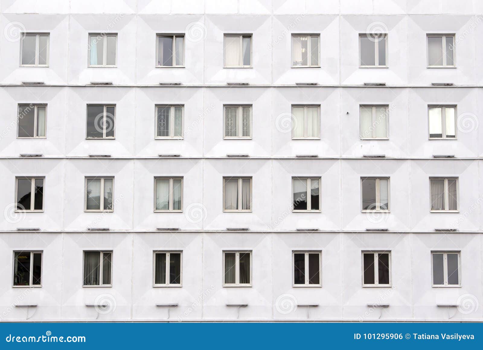 White Building Full of Windows. Full Frame of Building. Stock Photo ...