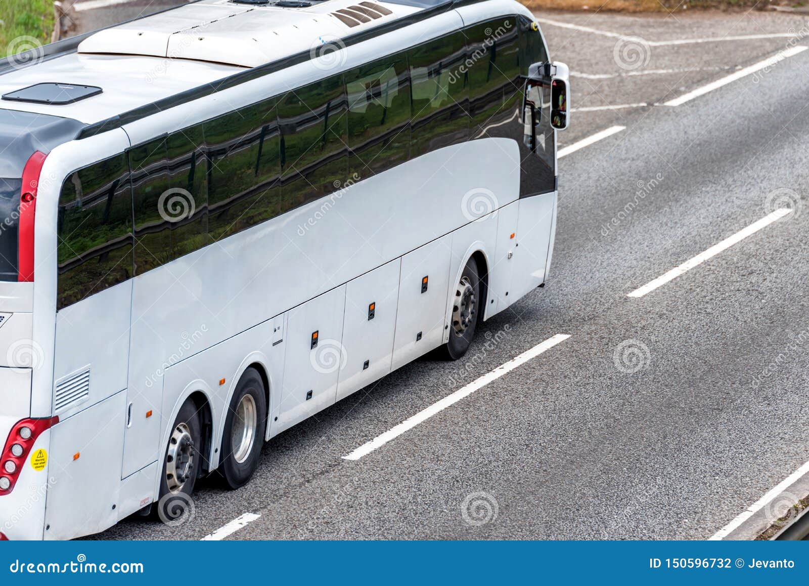 White Bus Coach on Uk Motorway in Fast Motion Stock Photo - Image of ...