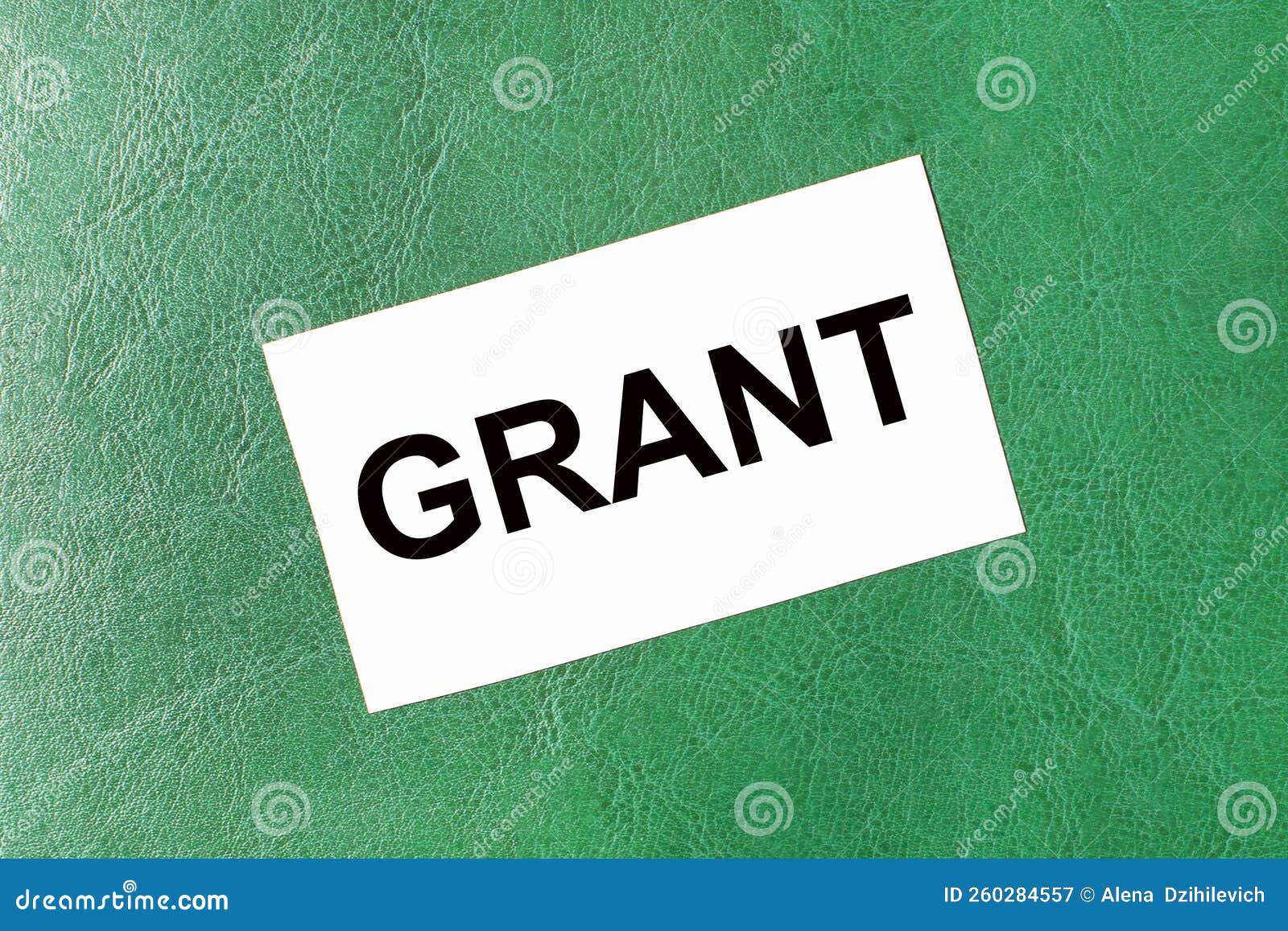 White Business Card with the Text GRANT on a Dark Green Background ...