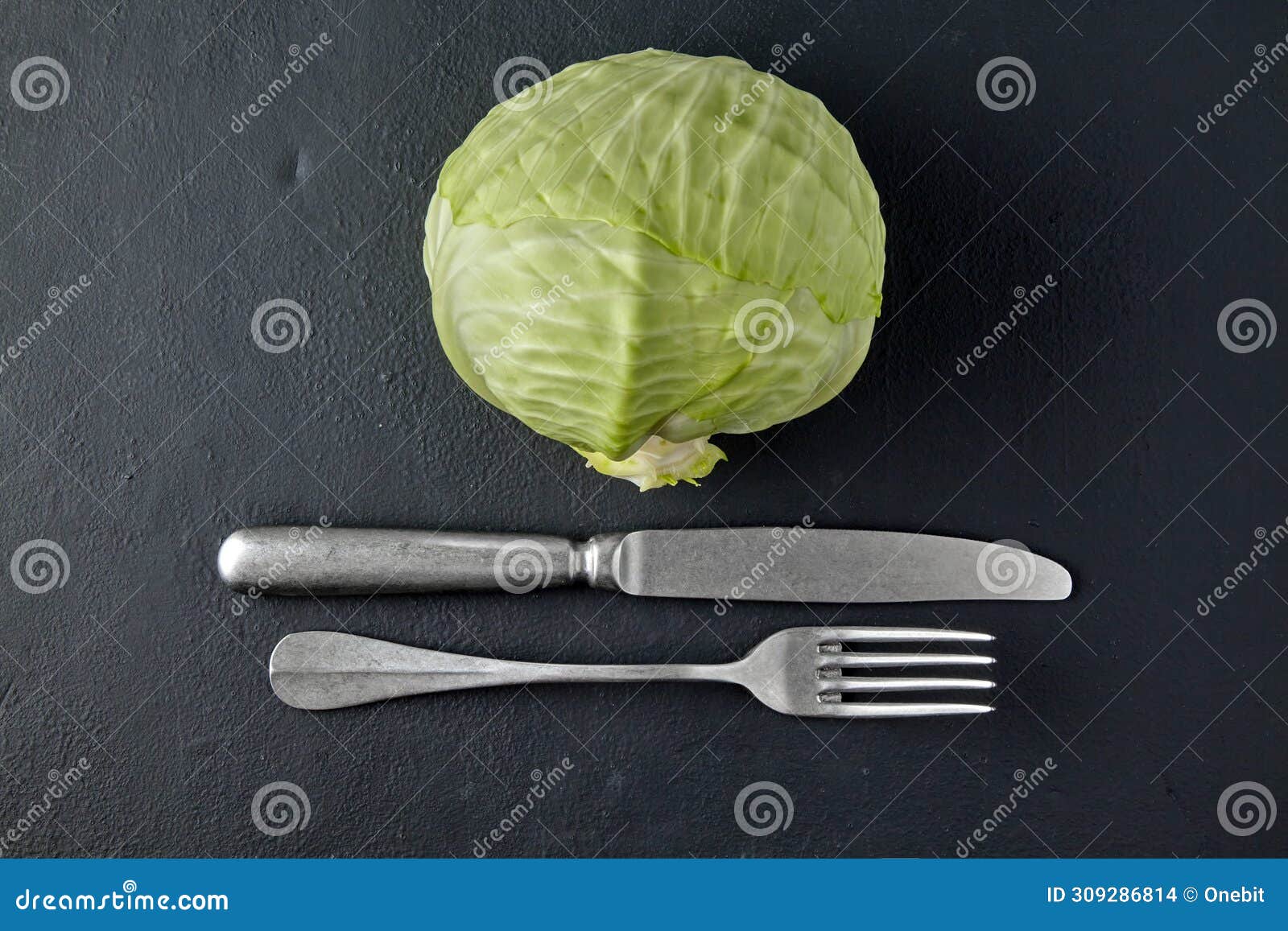 White Cabbage and Fork with Knife on Black Concrete Tabletop Stock ...
