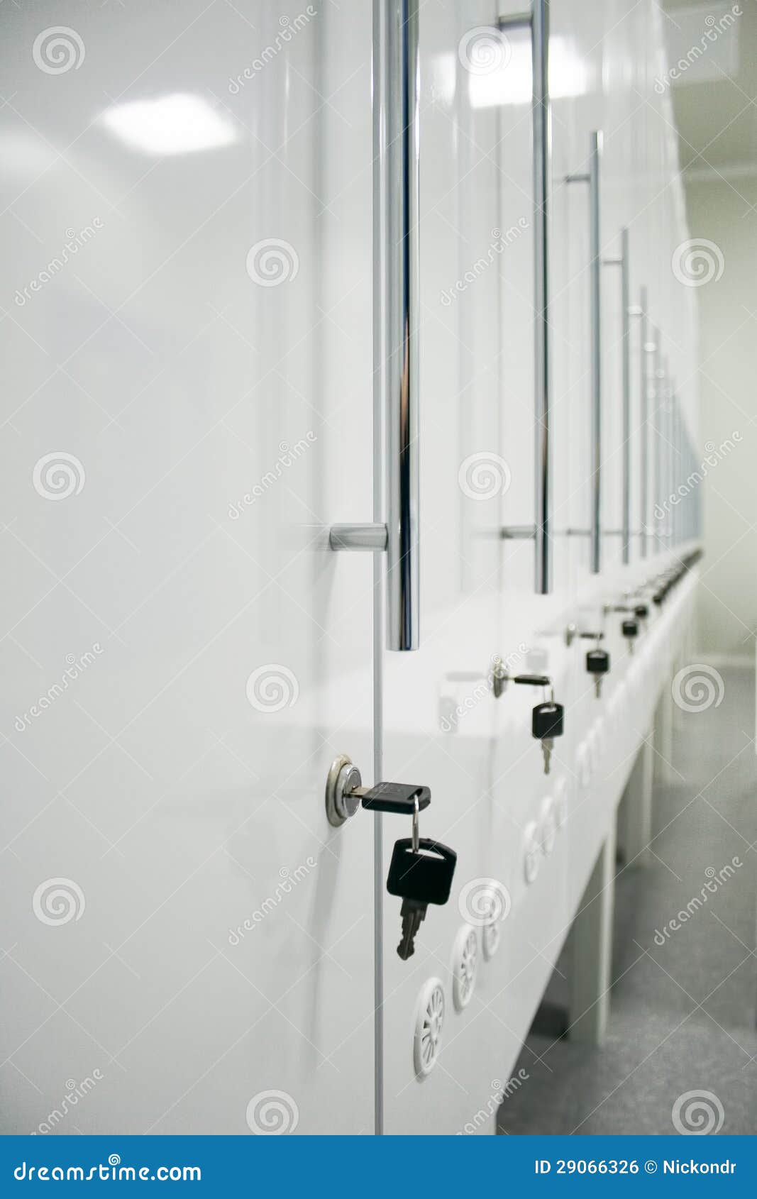 White Cabinets with Keys in a Locker Room Stock Photo - Image of ...