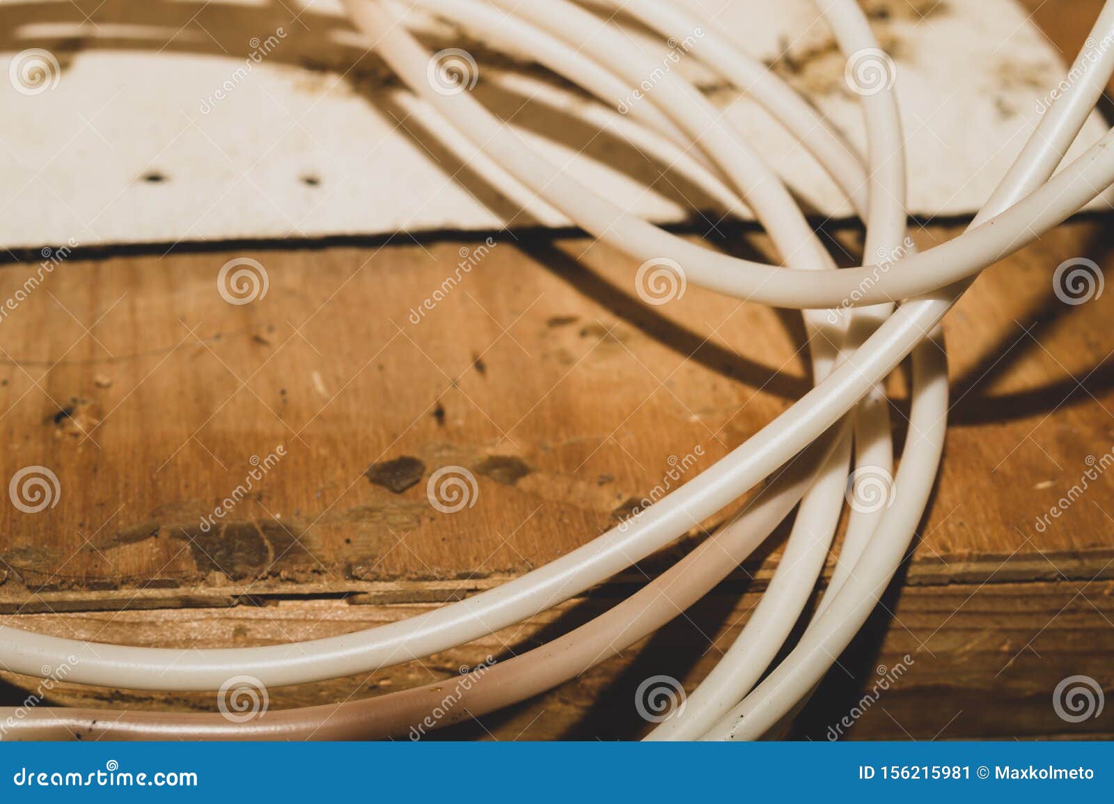 White Cable Lies on the Wooden Table. Connection Wire Stock Image ...