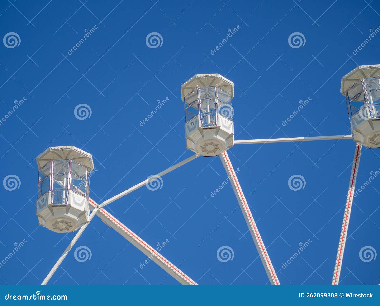 White Cabs of a Ferris Wheel on a Blue Background Stock Photo - Image ...