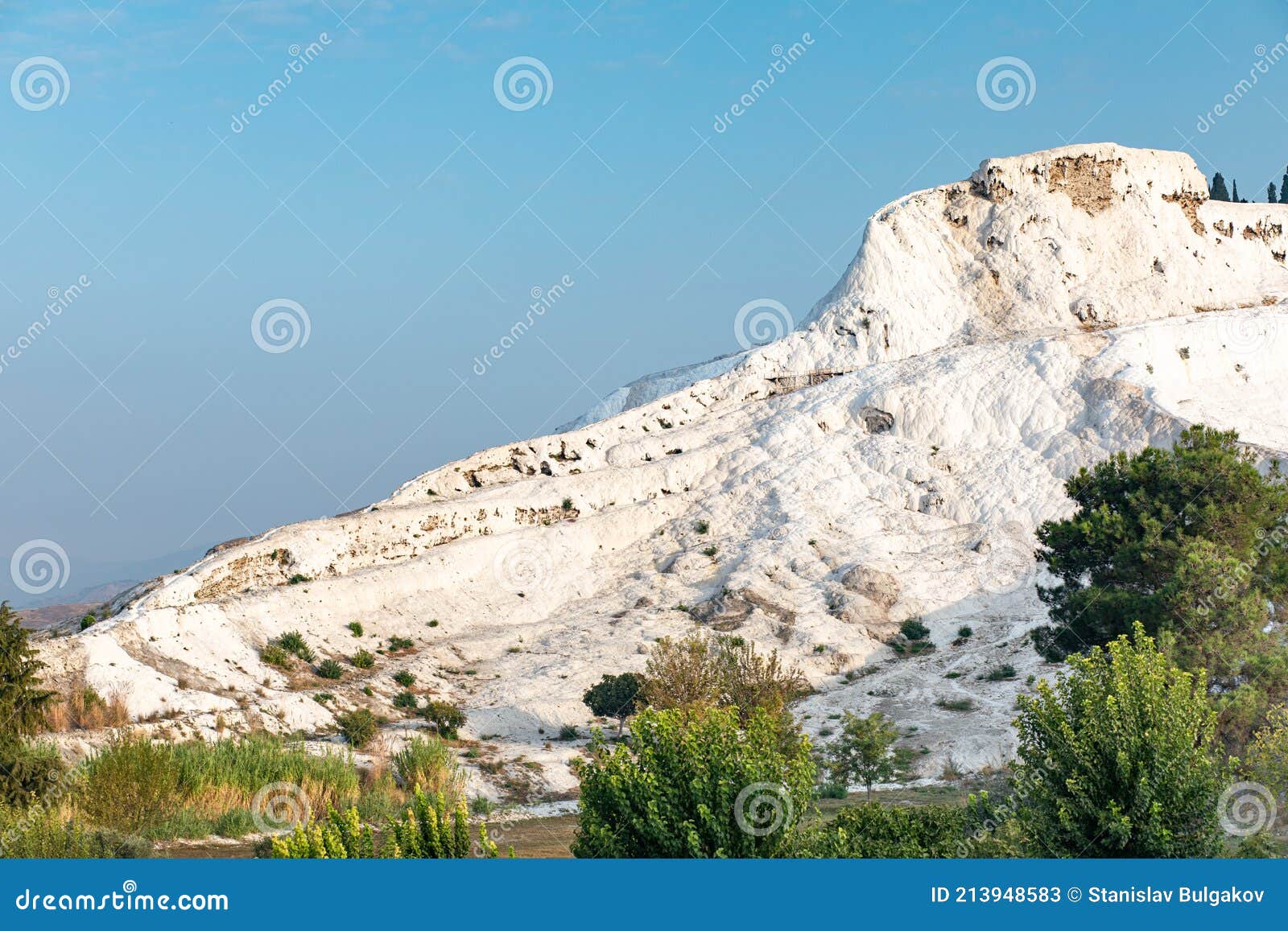 White Calcite Mountain in Pamukkale, Turkey on Background Blue Sky ...