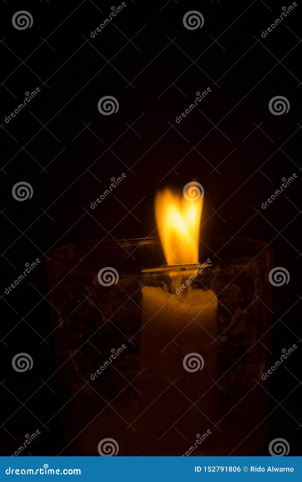 White Candle Inside the Glass with Yellow Flame Stock Photo - Image of ...