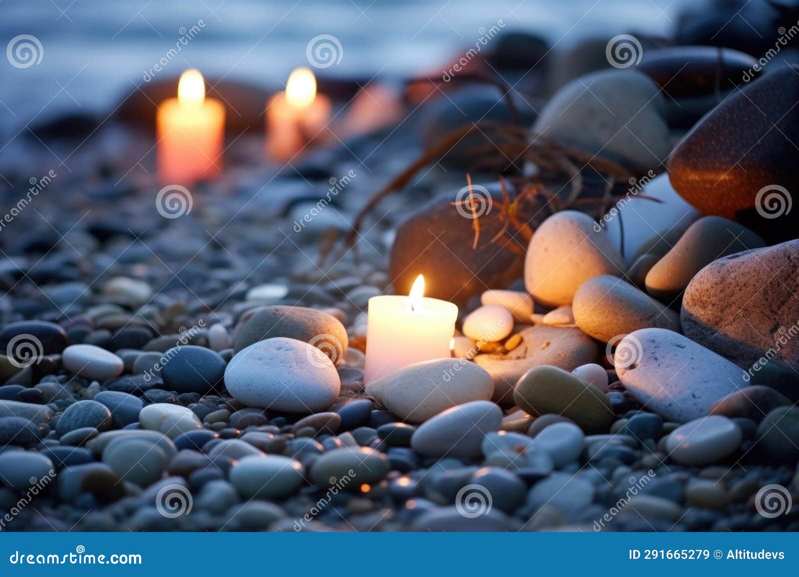 White Candles Lit and Placed on Pebble Rocks Stock Image - Image of ...