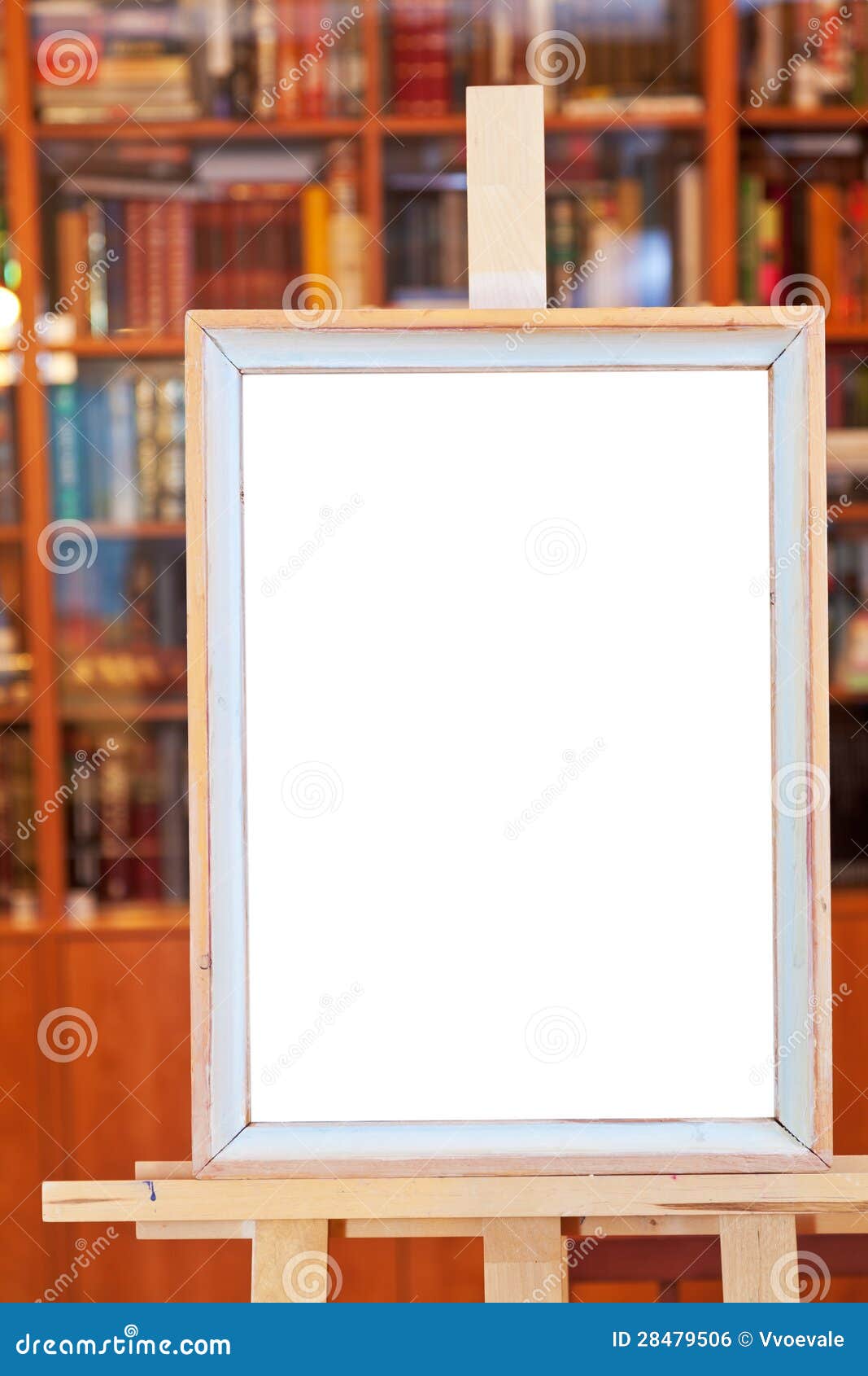 White Canvas of Simple Picture Frame on Easel in Library Stock Photo ...