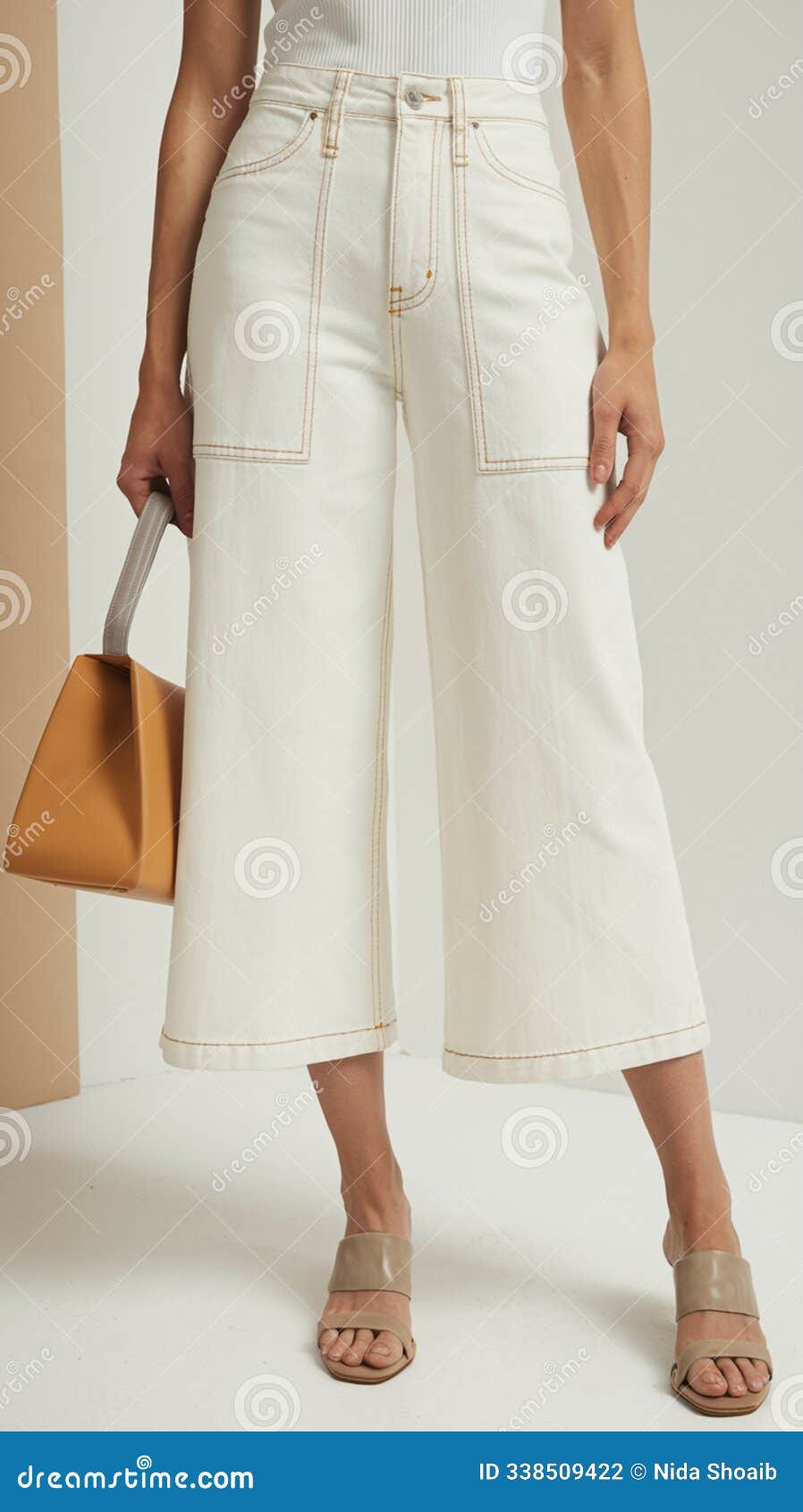 White Capri Pants with Pockets, Button Closure, Back Zipper, Displayed ...