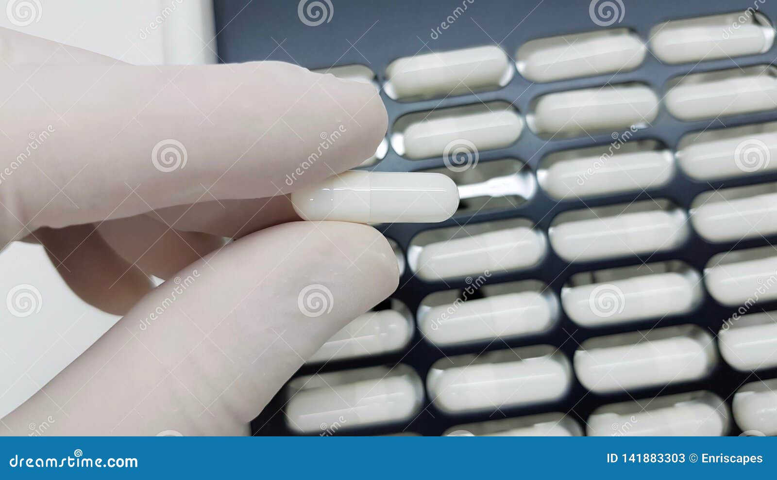 White capsules compounding stock image. Image of machine - 141883303