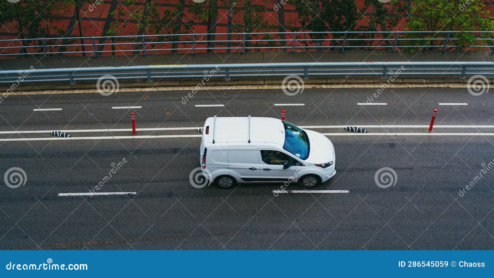 Car Driving Down the Road in City Stock Image - Image of automobile ...