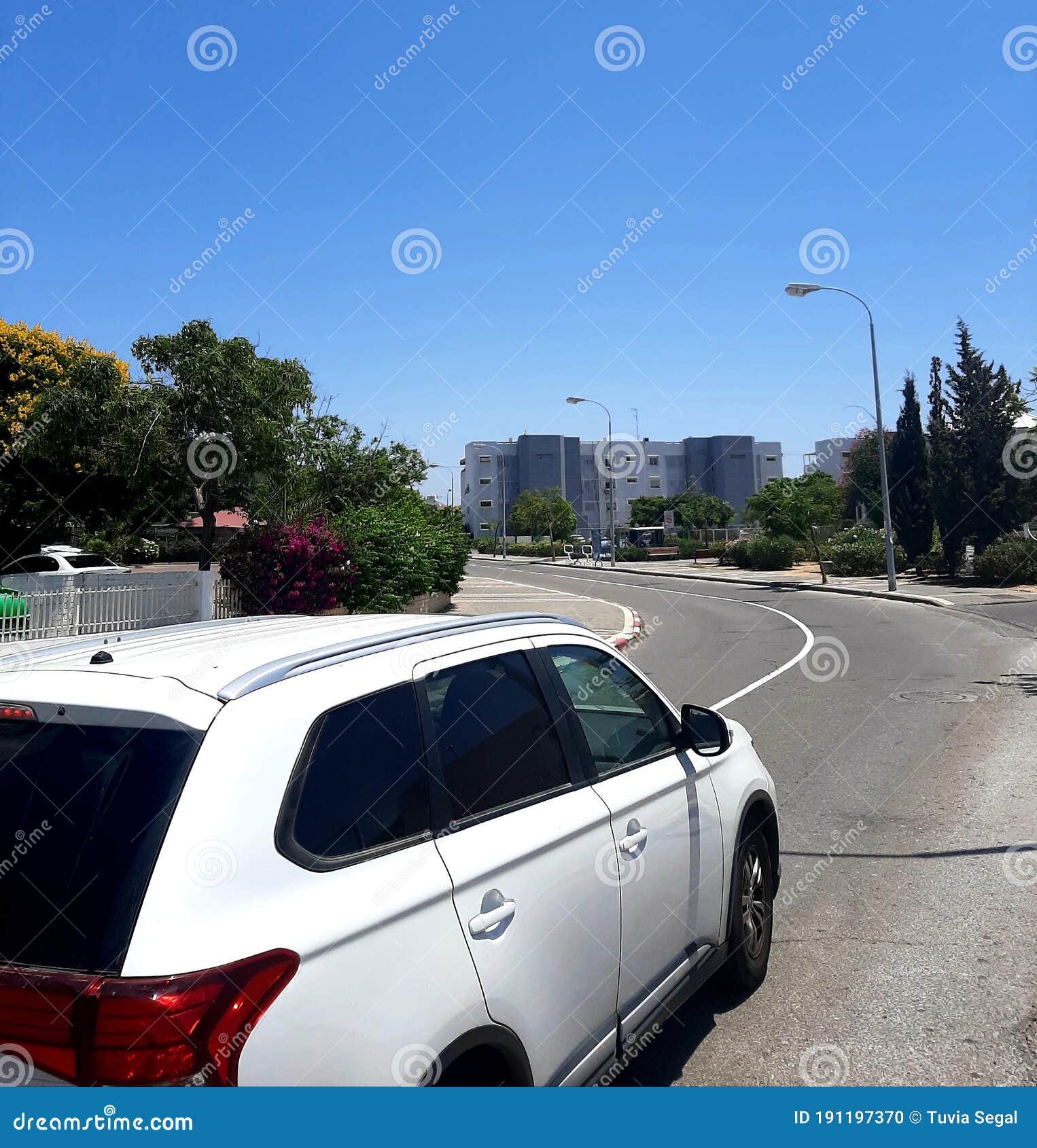 A White Car Driving on a Left Curve Stock Photo - Image of white ...