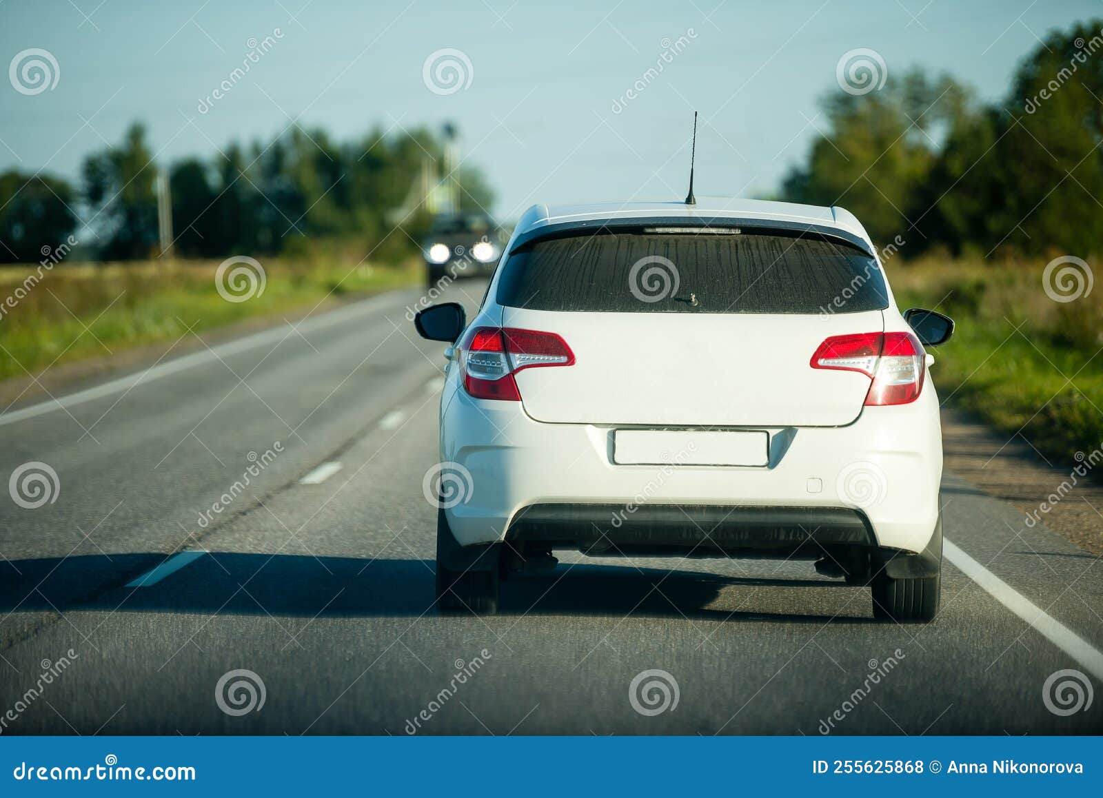 White Car is Driving on the Road Stock Photo - Image of speed, blurred ...