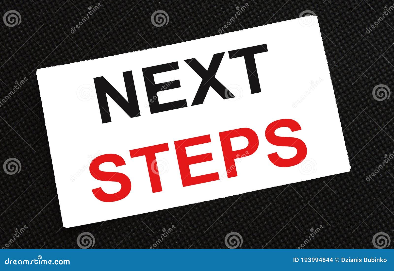White Card on the Black Background with Text Next Steps Stock Photo ...