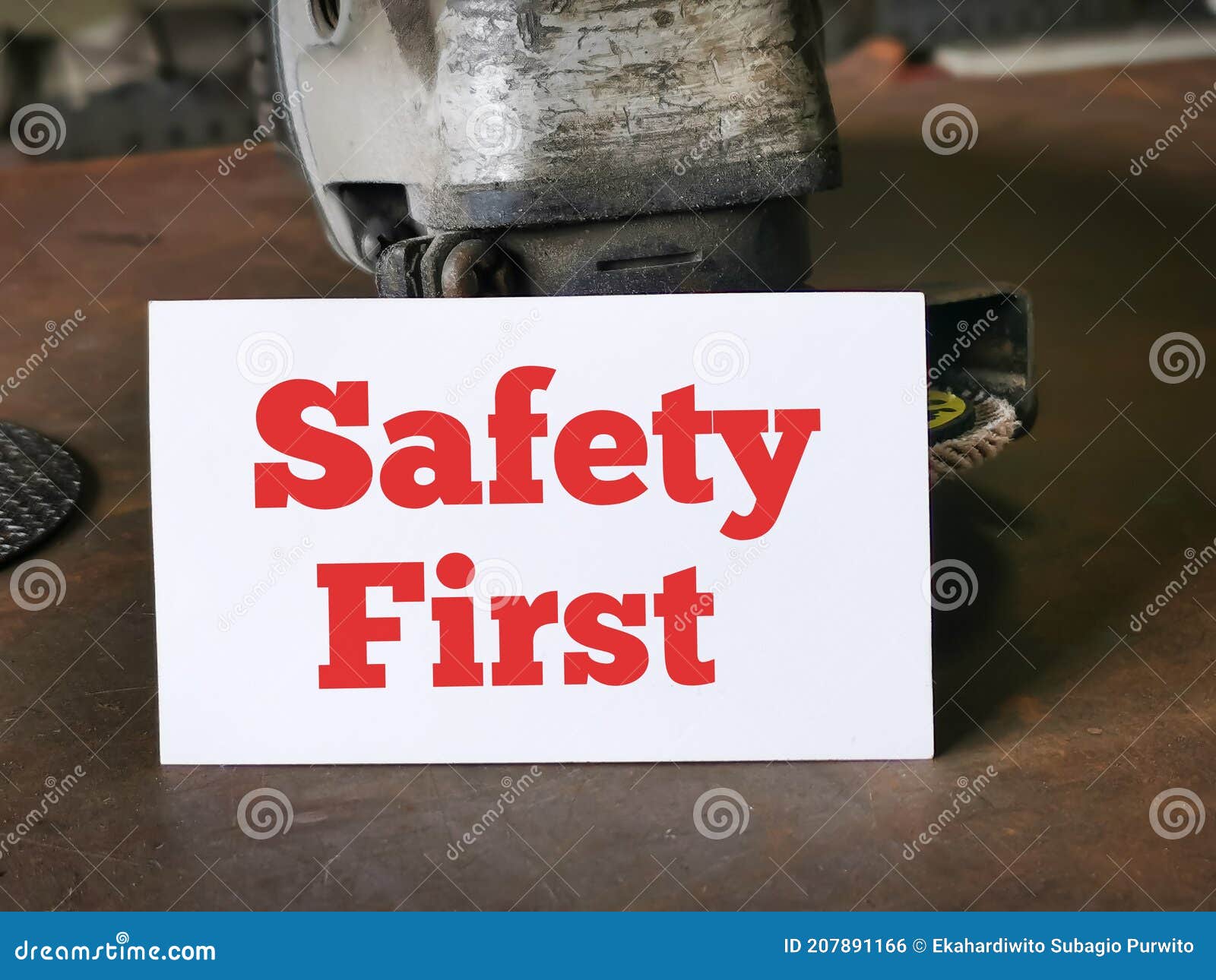 White Card Written SAFETY FIRST on Tools Table. Stock Photo - Image of ...
