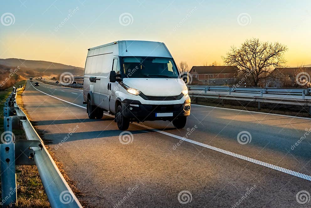 White cargo van on Highway stock photo. Image of open - 330430838