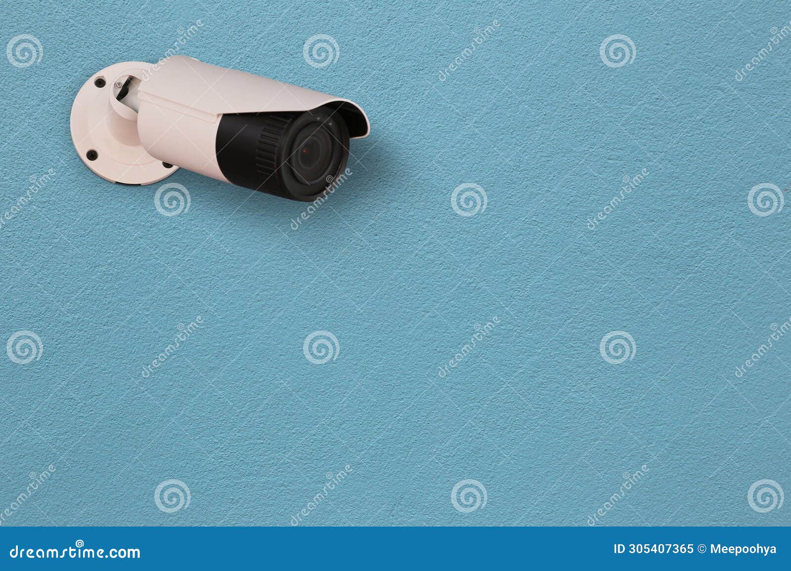 White CCTV Camera System Mounted on Light Blue Wall of Blue Cement Wall ...