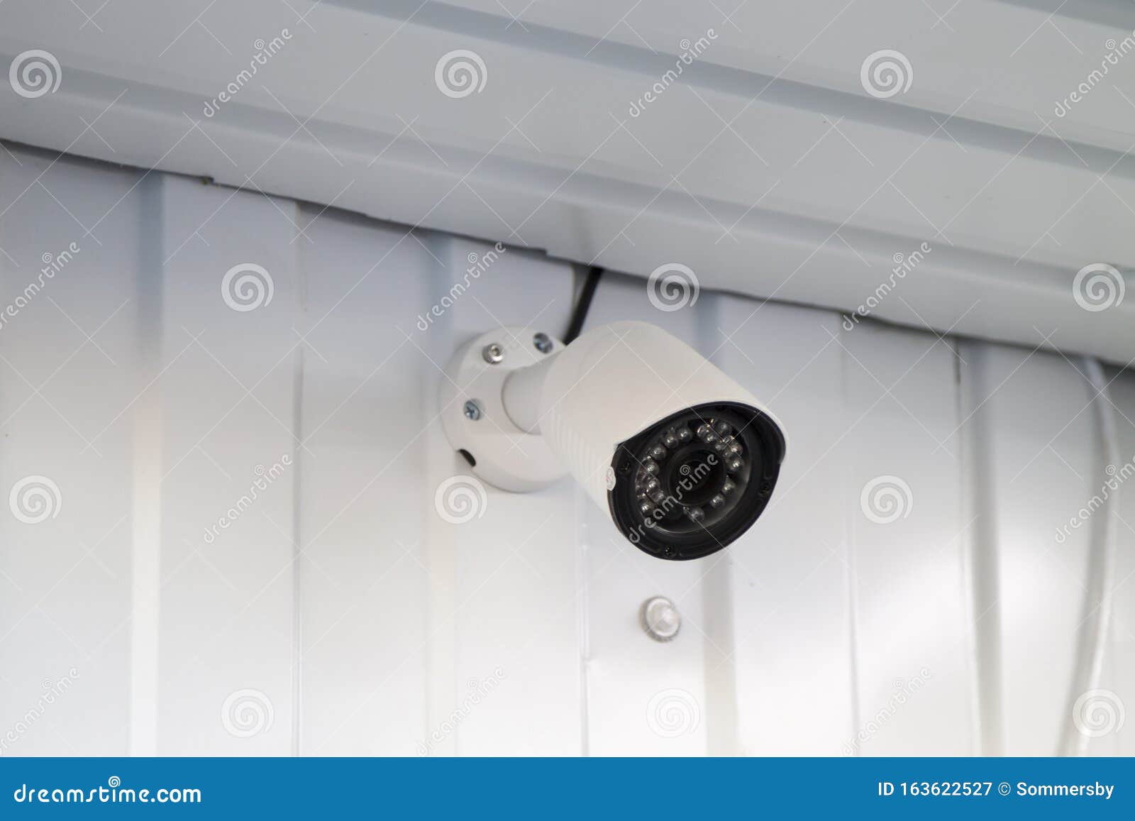 White CCTV Surveillance Camera Mounted on Wall of Building Stock Image ...