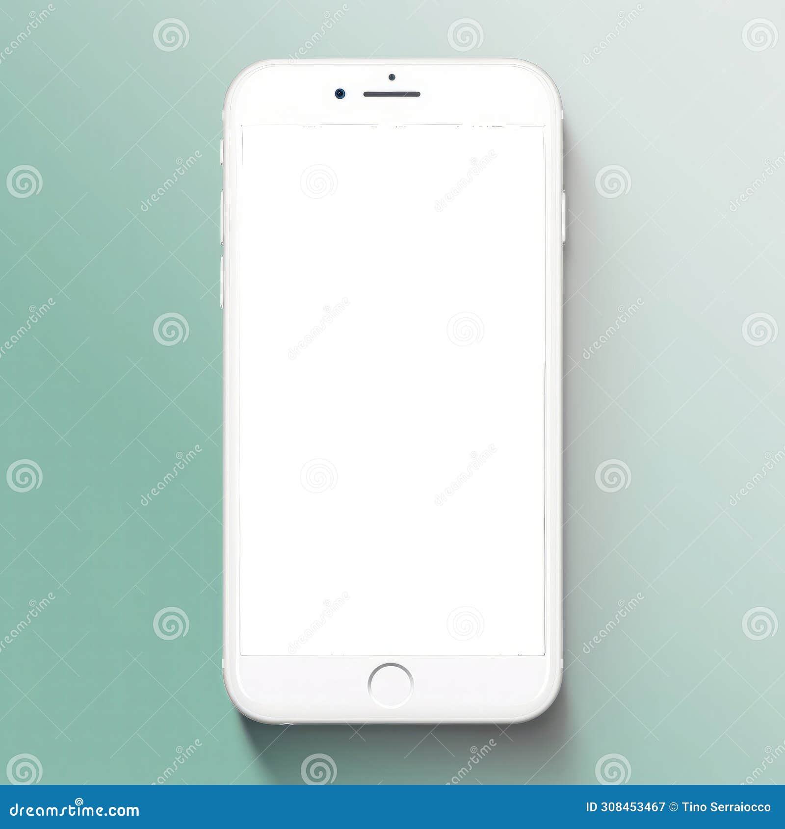 A White Cell Phone with a Blank Screen is Sitting on a Green Surface ...