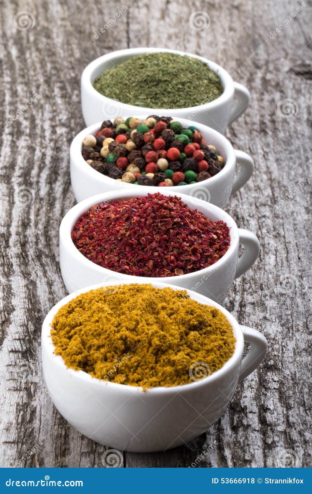 White Ceramic Cups with Different Kinds of Spices on Old Wooden Stock ...