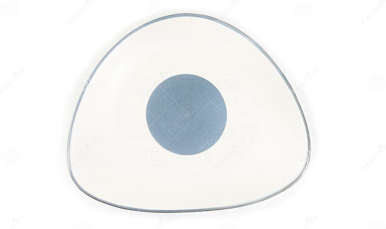 A White Ceramic Triangular Plate with Rounded Corners and a Light Blue ...