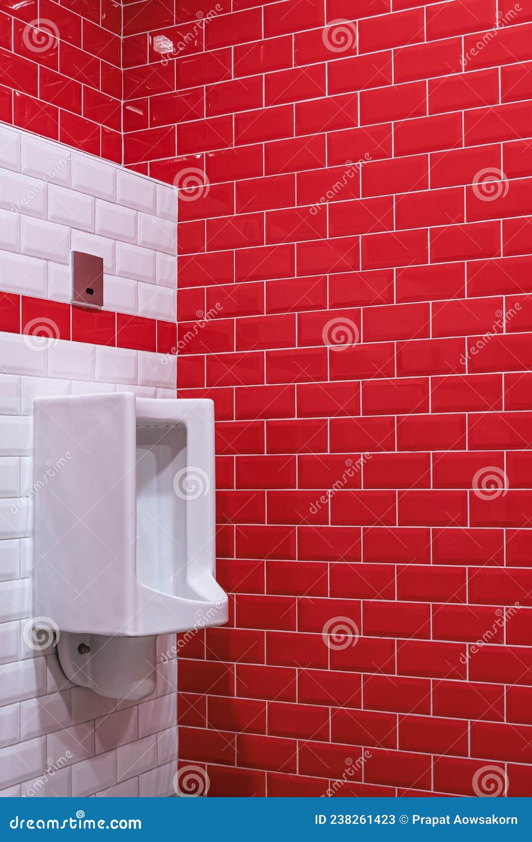 White Ceramic Urinal on Red Tile Wall in Public Men`s Restroom in ...