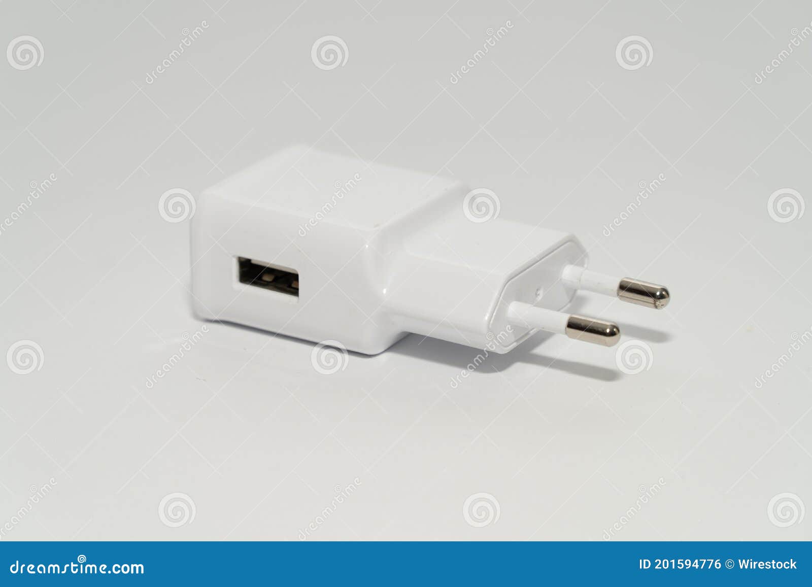 White Charger Adapter Isolated on a White Background Stock Photo ...