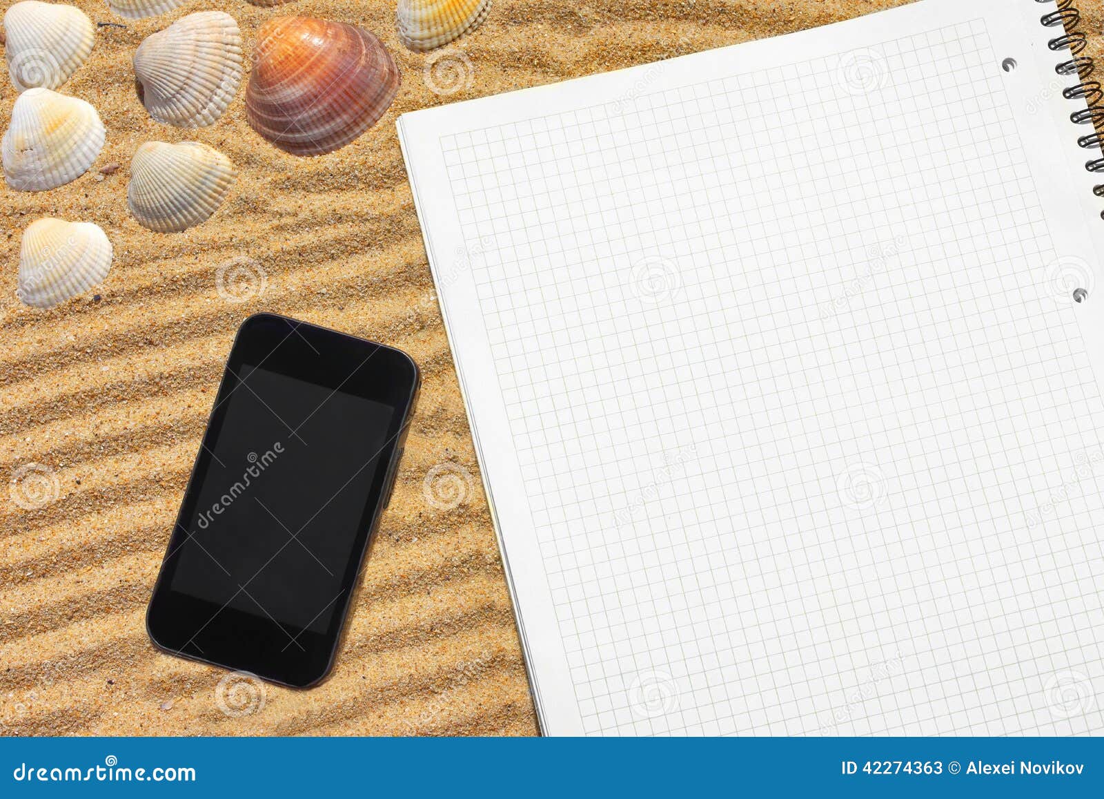 White Checkered Notepad and Smartphone on the Beach Stock Image - Image ...