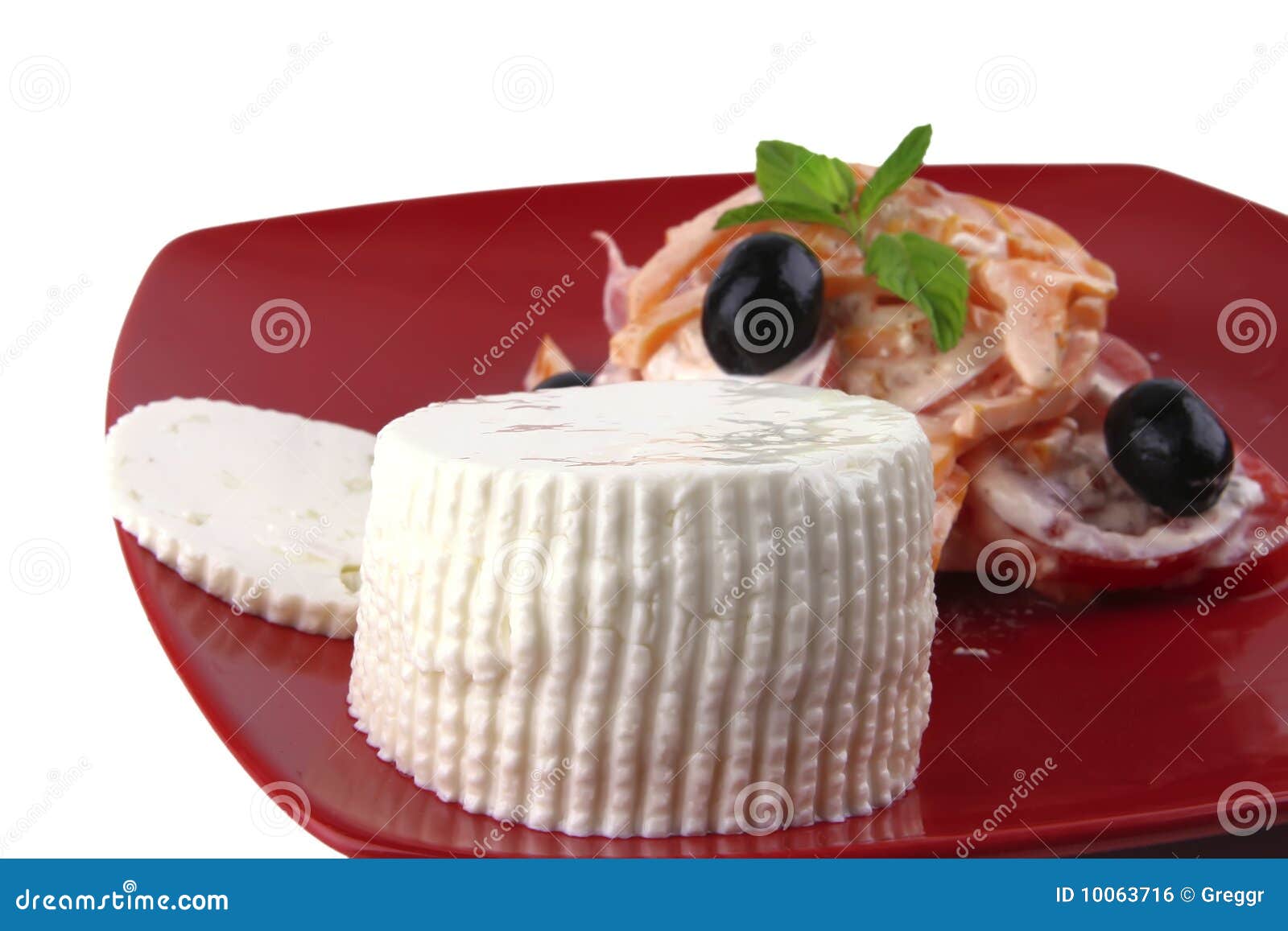 White cheese on red dish stock photo. Image of eating - 10063716