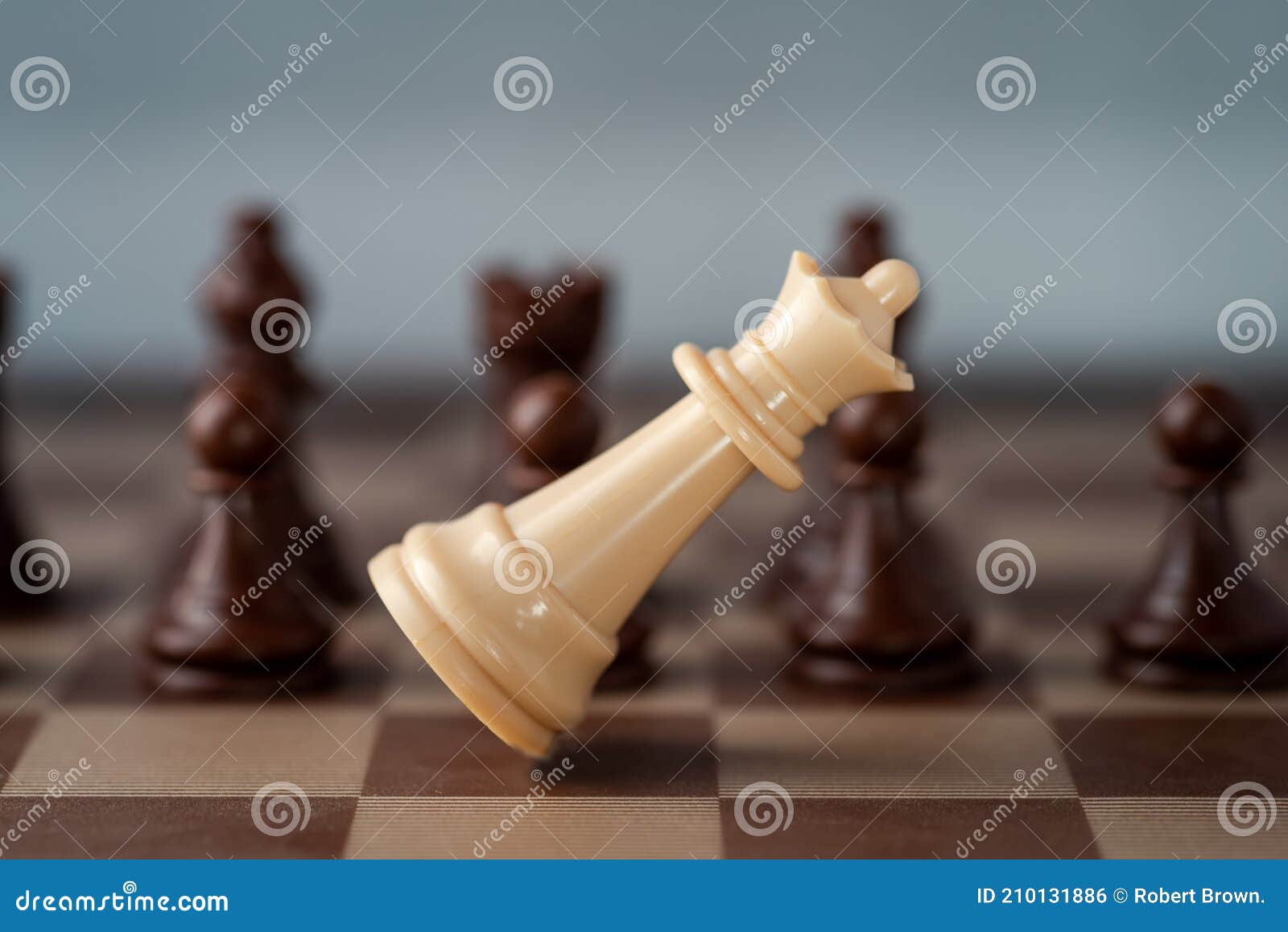 White Chess Castle Falling on Chess Board Concept of Failing Stock ...