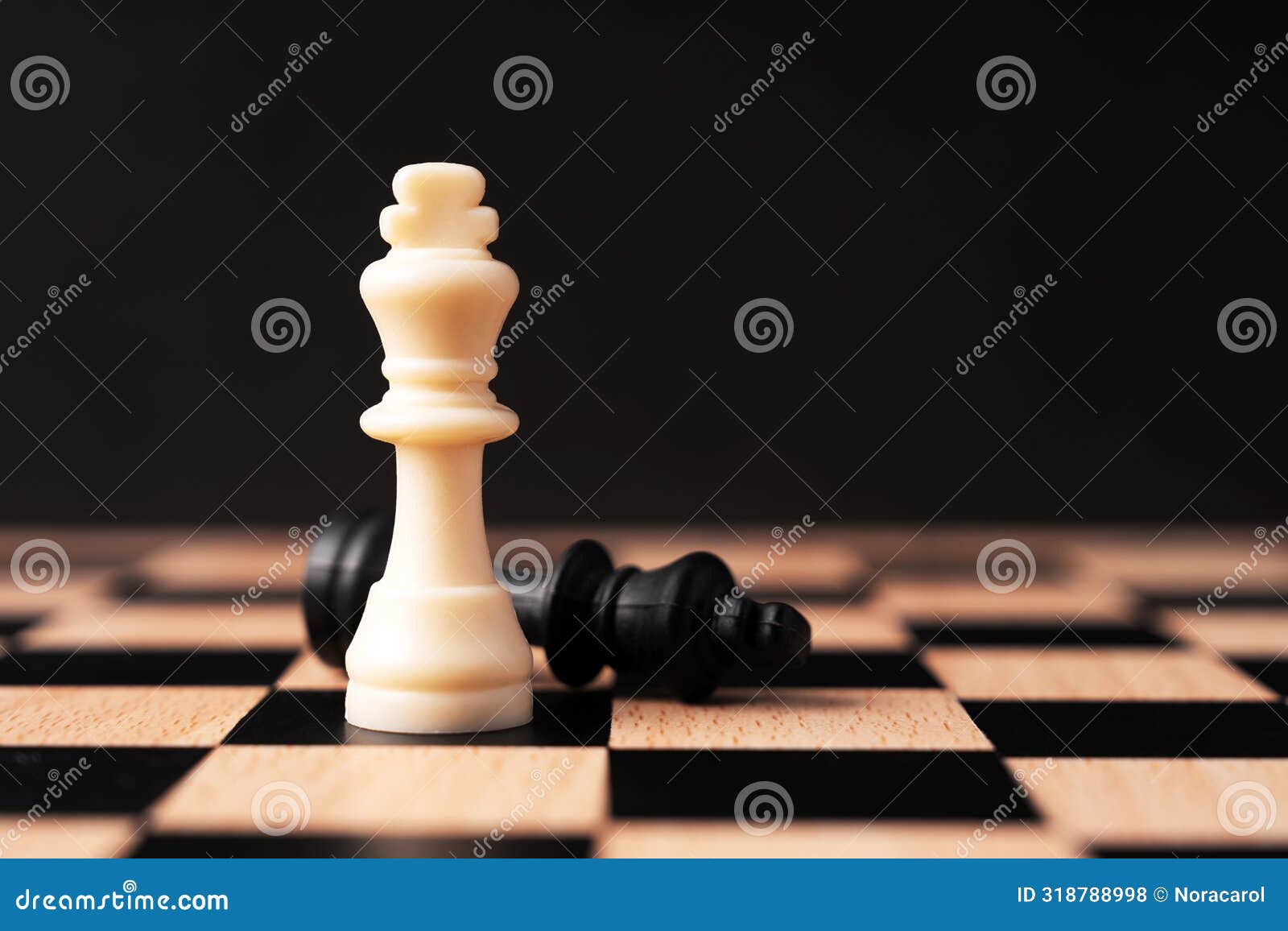 White Chess King Fallen Near Black Chess King Stock Photo - Image of ...
