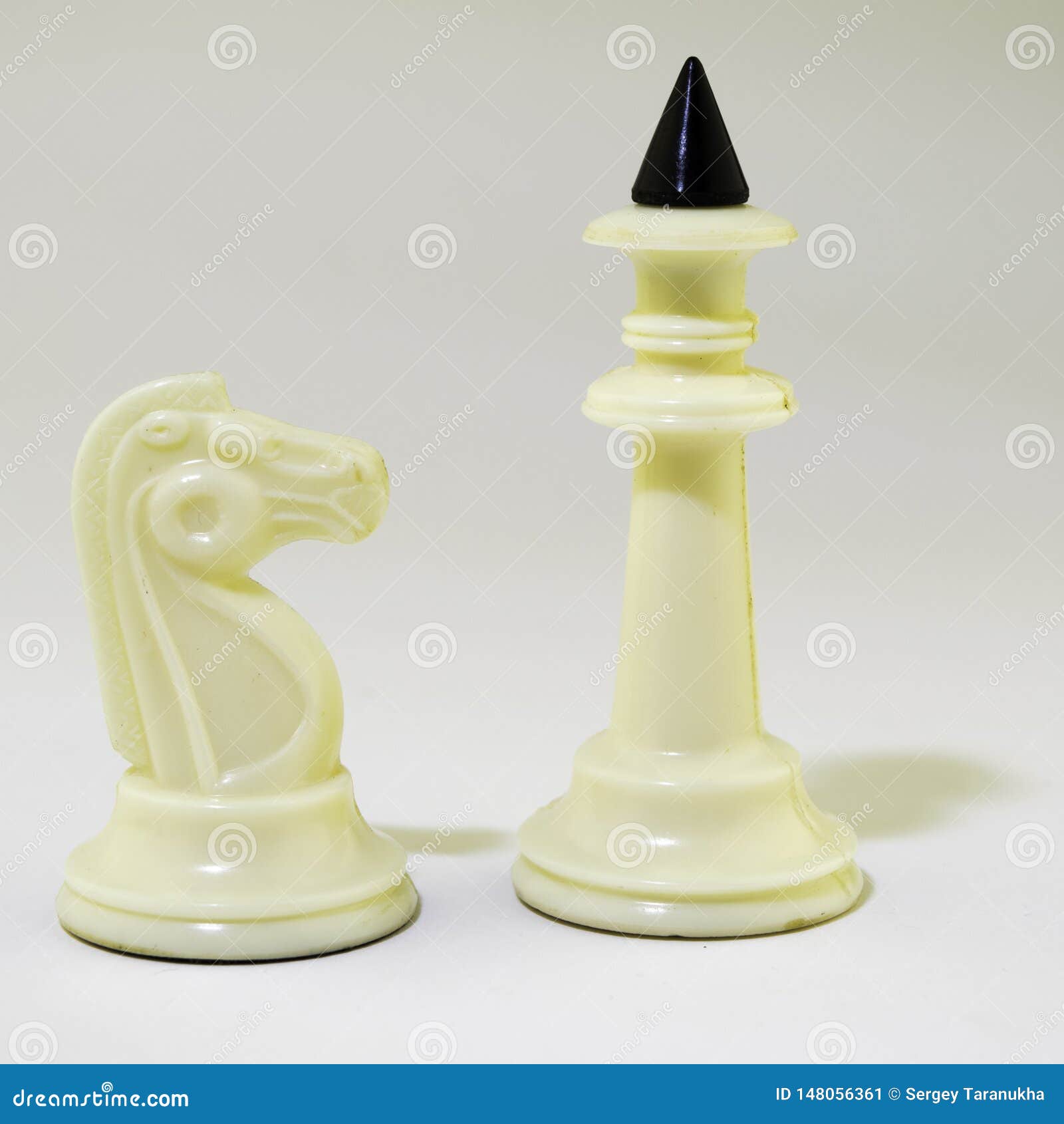 Knight And King Chess Piece Standing On The Board With A Team Royalty ...