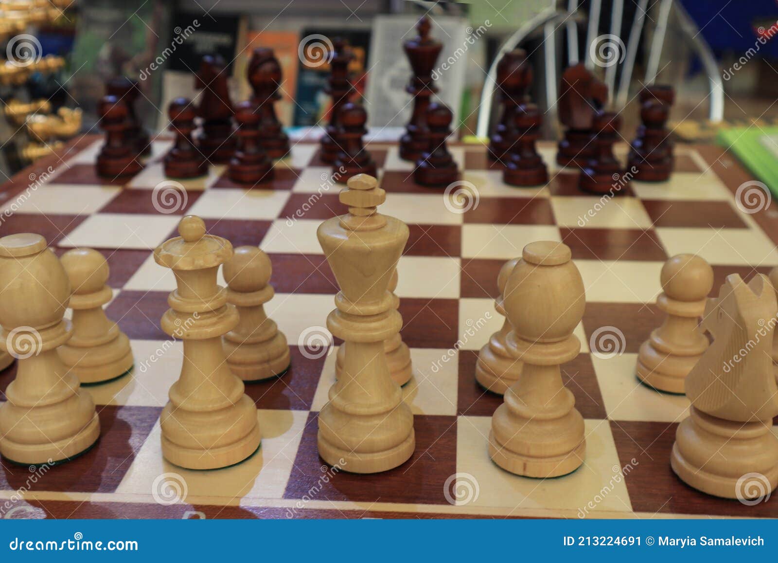 White Chess Pieces Stand in Front of Black Pieces, Side View Stock ...
