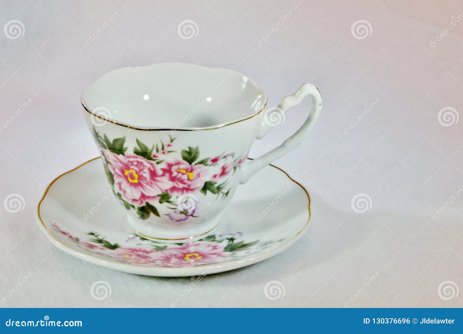 Tea cup with roses stock photo. Image of roses, pink - 130376696
