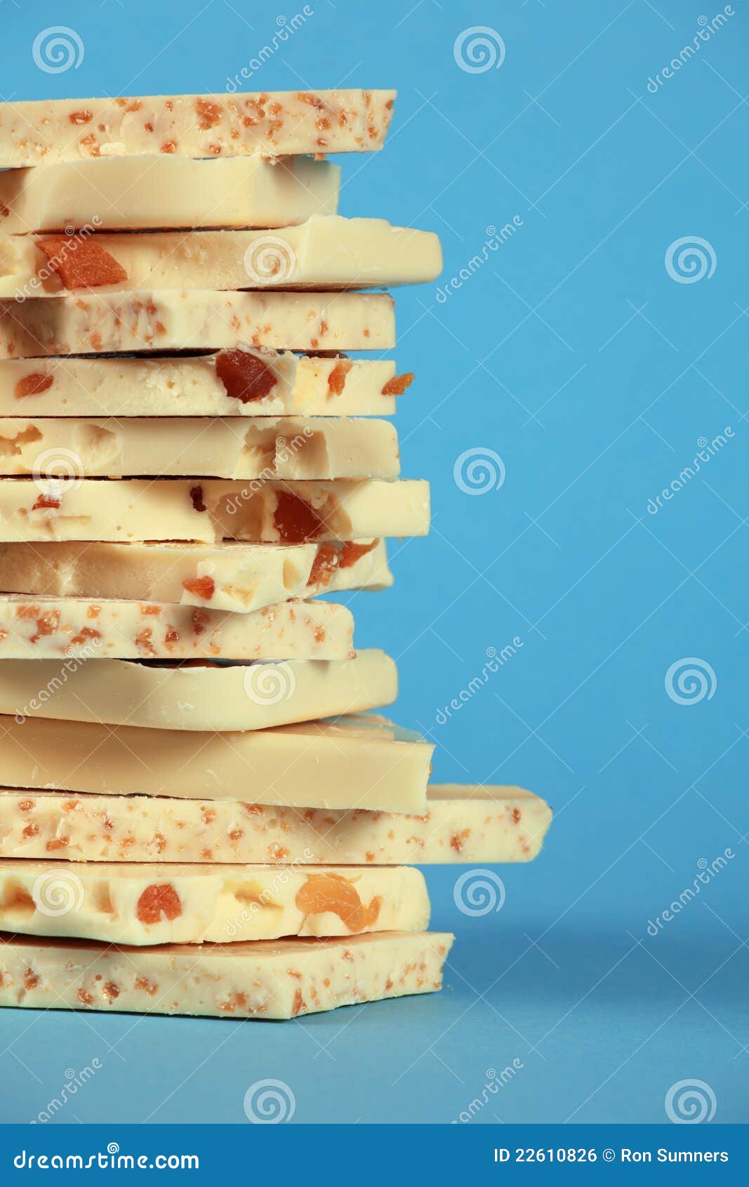 White Chocolate Stack on Blue Background Stock Photo - Image of white ...