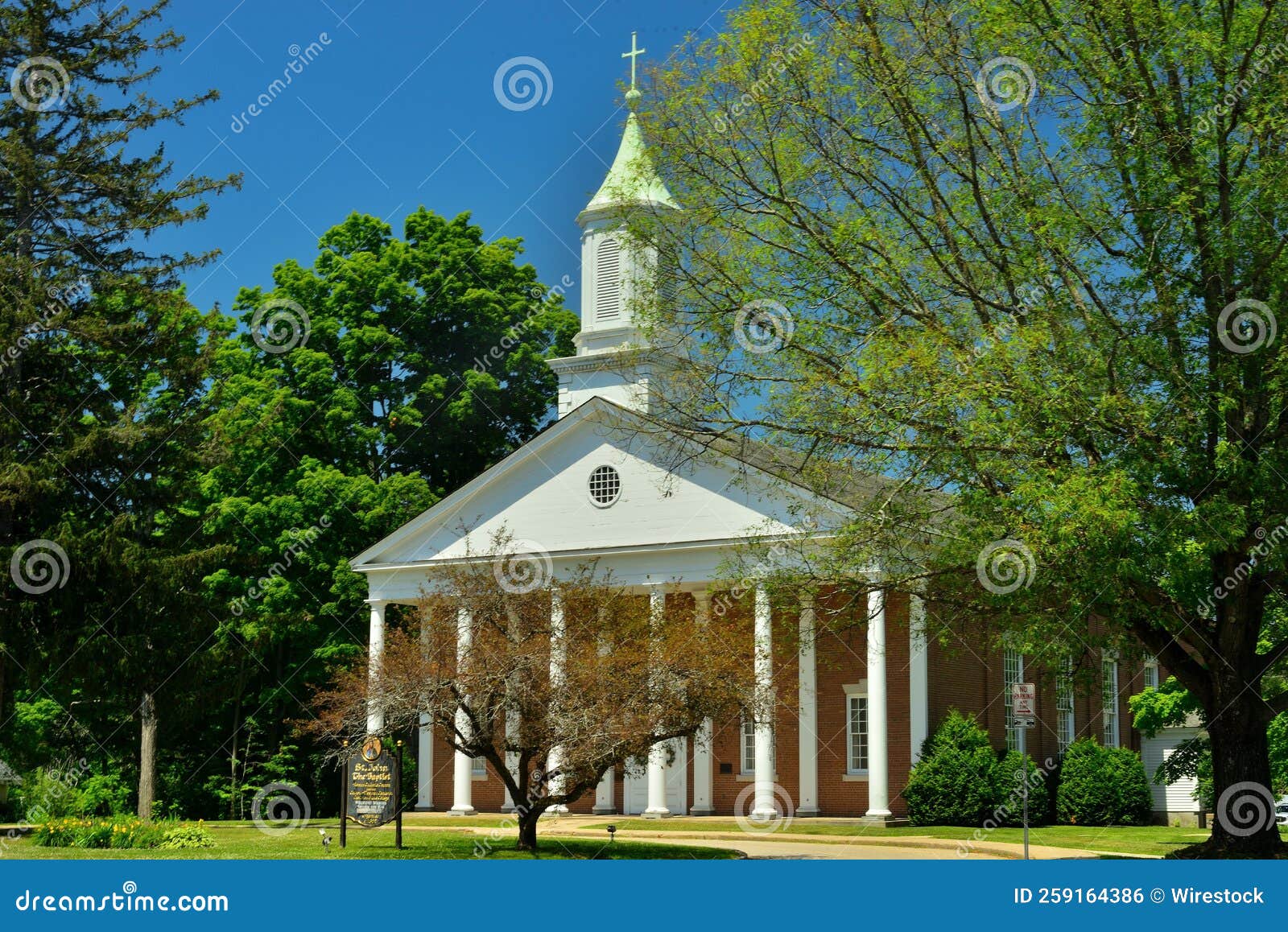 White Church Building with Tall Trees Stock Photo - Image of building ...
