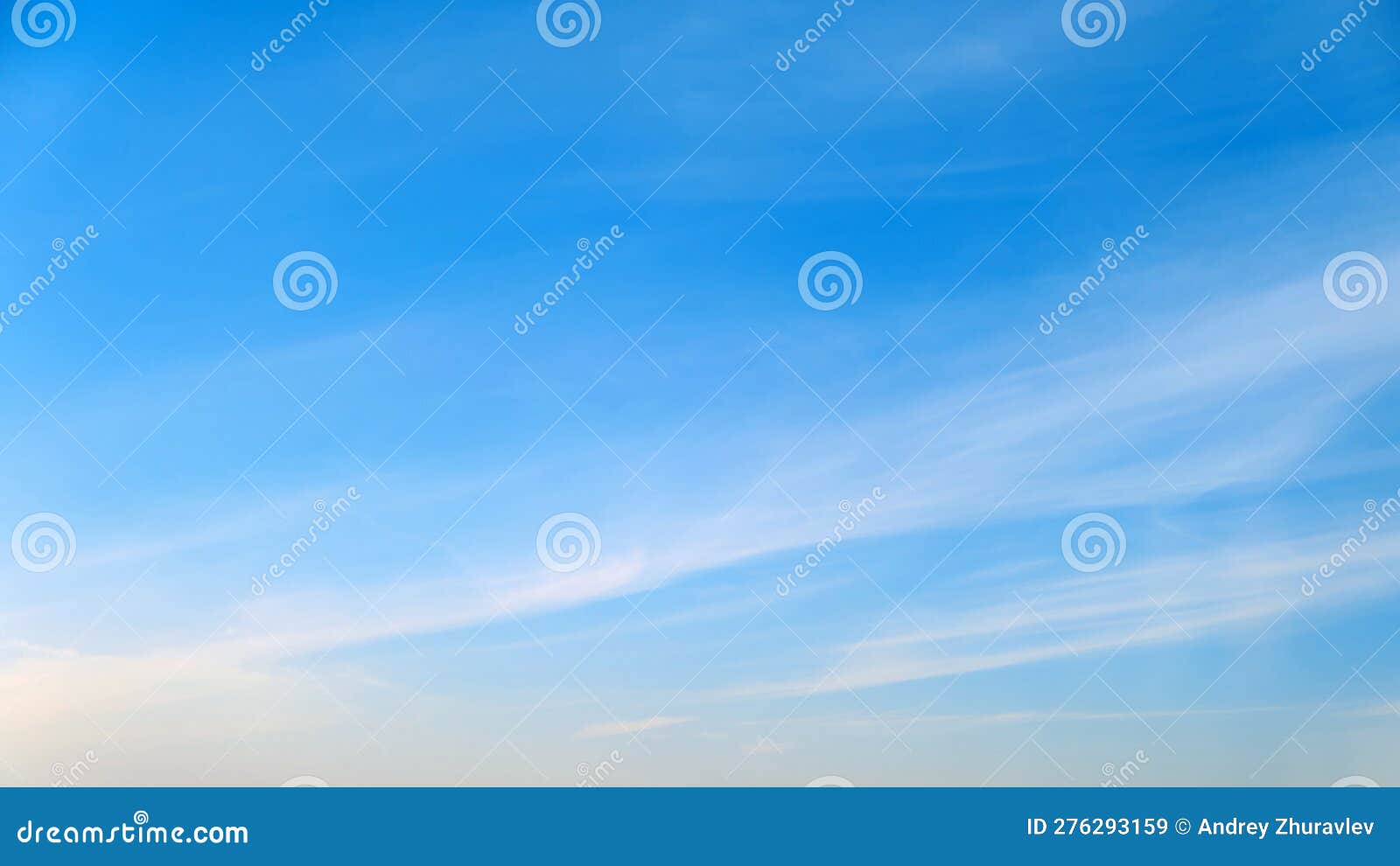 White Cirrus and Stratus Clouds in a Blue Daytime Sky Stock Image ...
