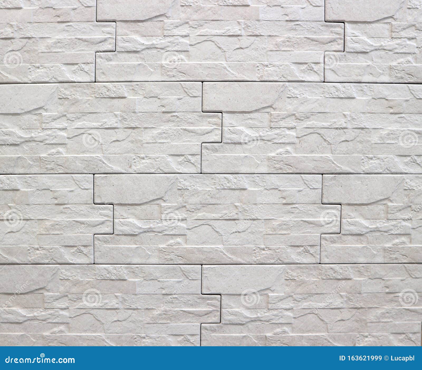 White Cladding Wall Made of Stoneware with Interlocking Tiles ...
