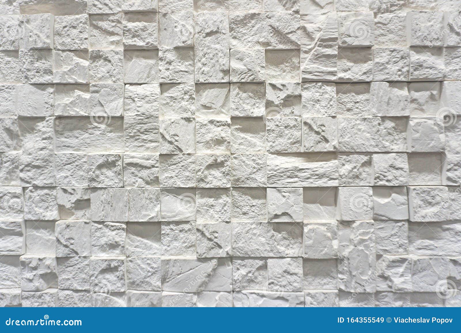 White Cladding Wall Made Of Stoneware With Interlocking Tiles ...