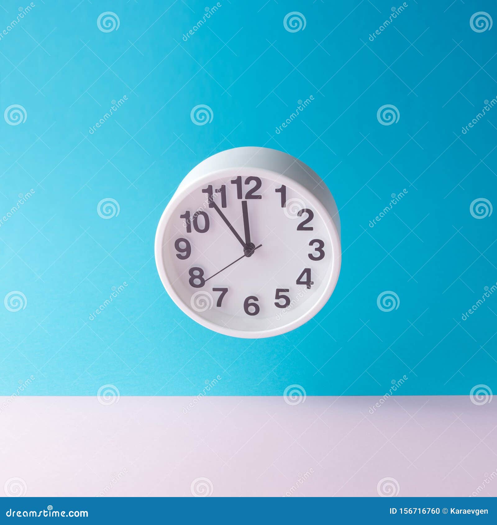 White Clock on Bright Blue Background. Minimal Time Concept Stock Photo ...