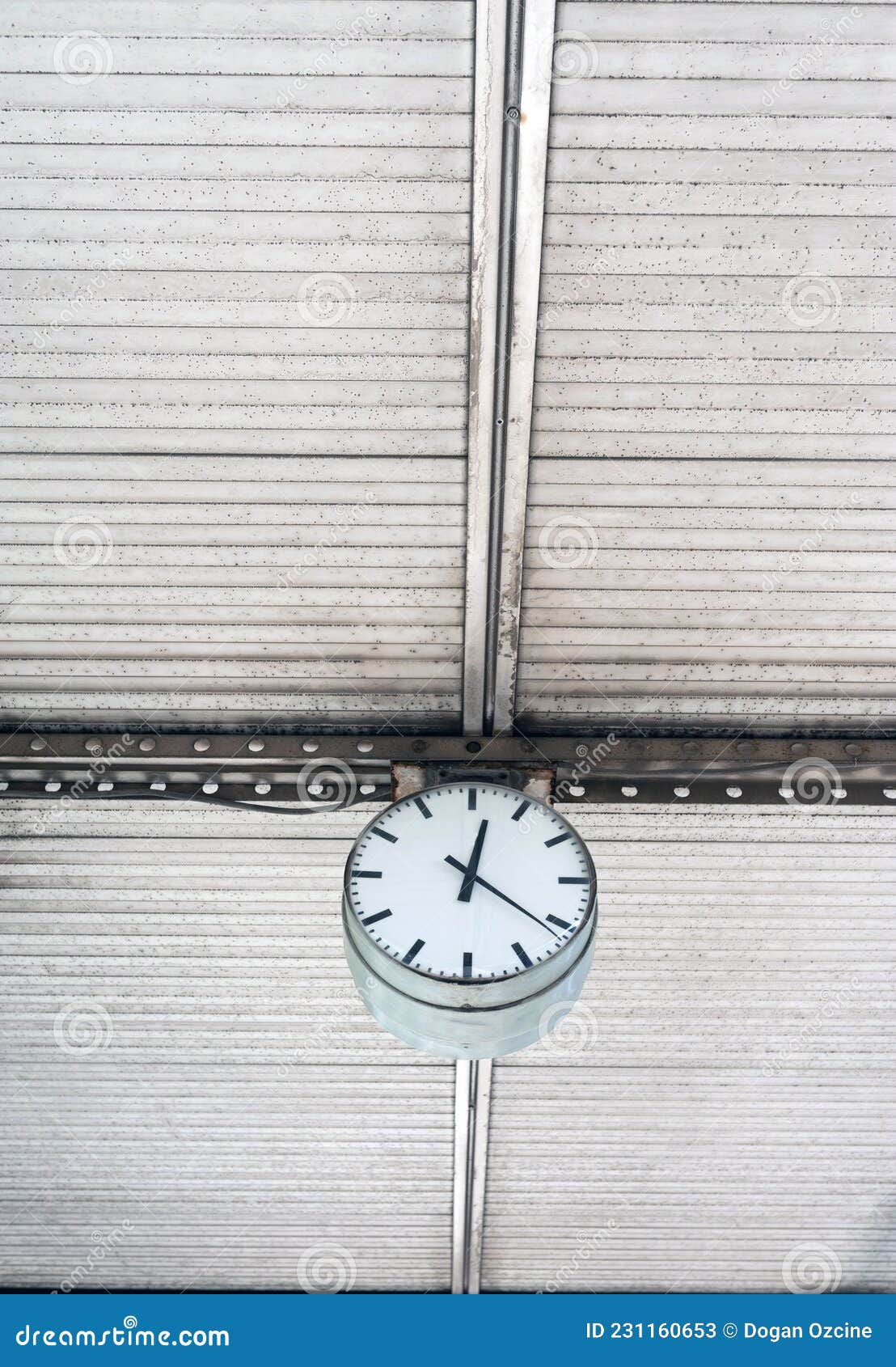 White Clock Hanging from the Ceiling Stock Image - Image of flooring ...