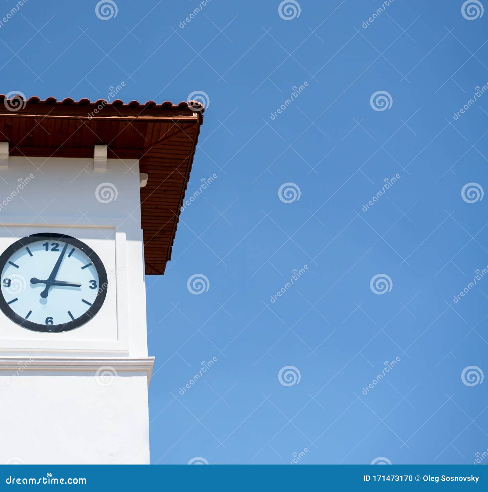 White Clock Tower on a Background of Blue Sky. Time To Rest Stock Photo ...